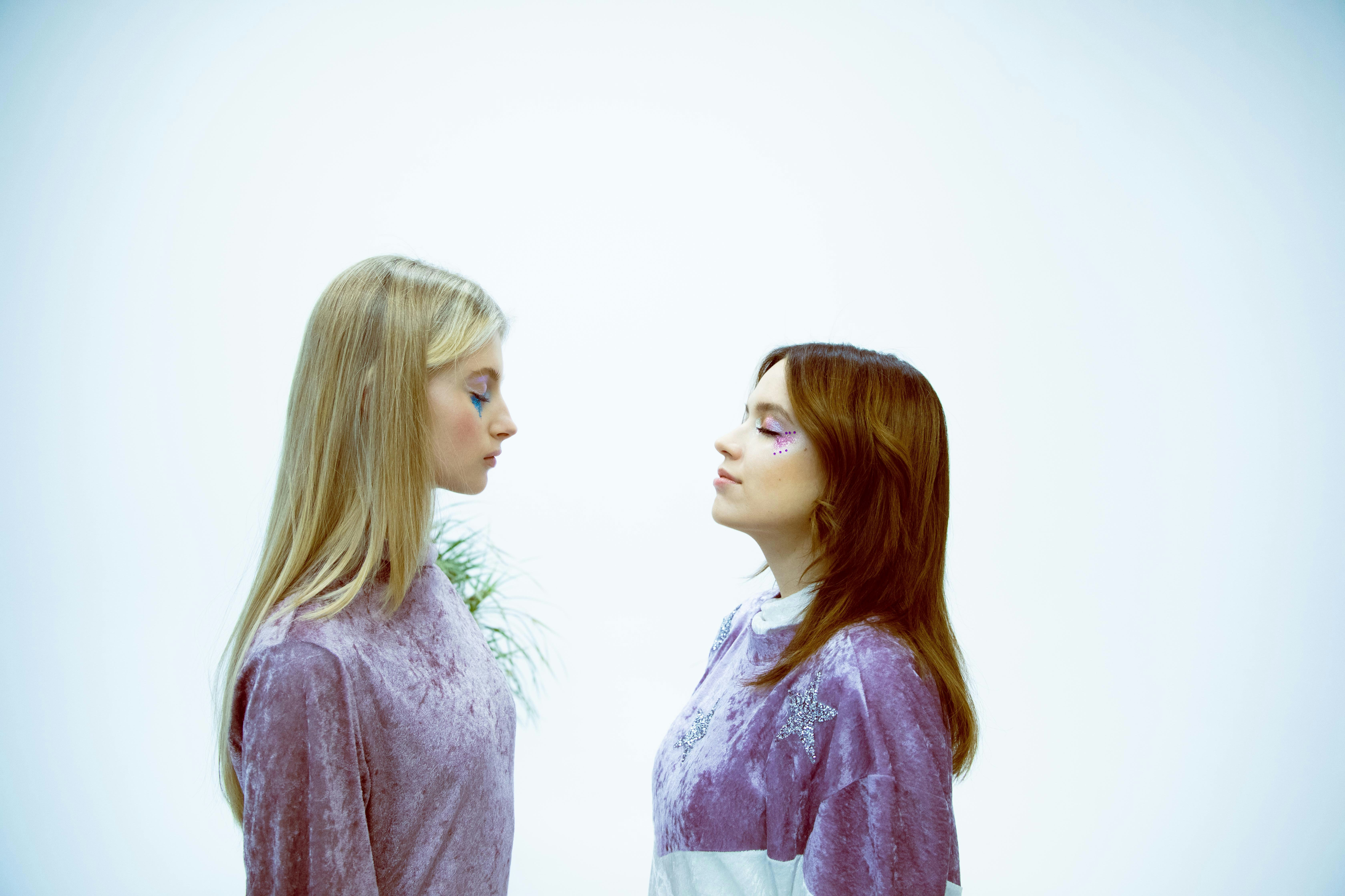 Two Faces in a Quiet Exchange