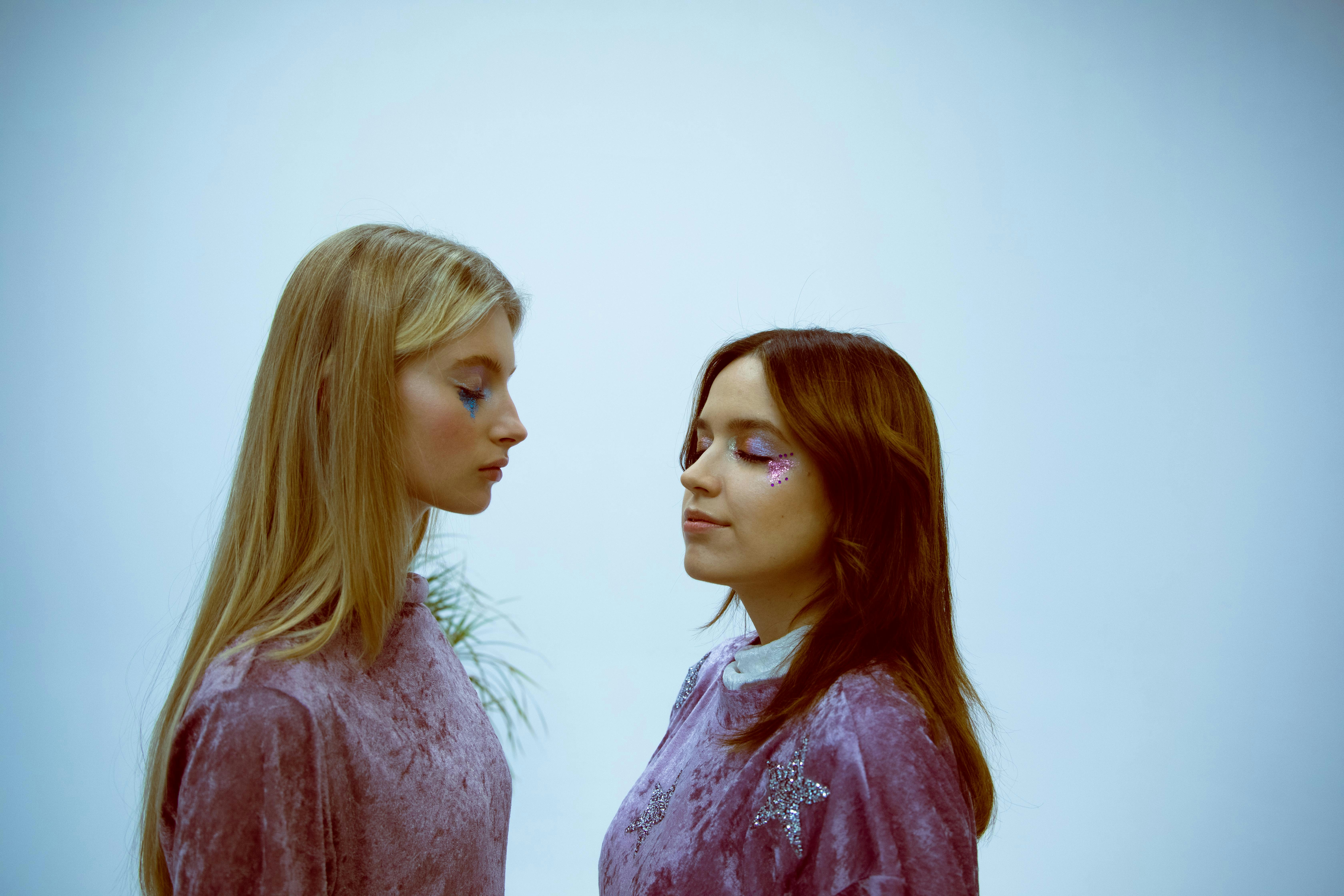 Veil of Violet: Quiet Exchange Between Two Friends