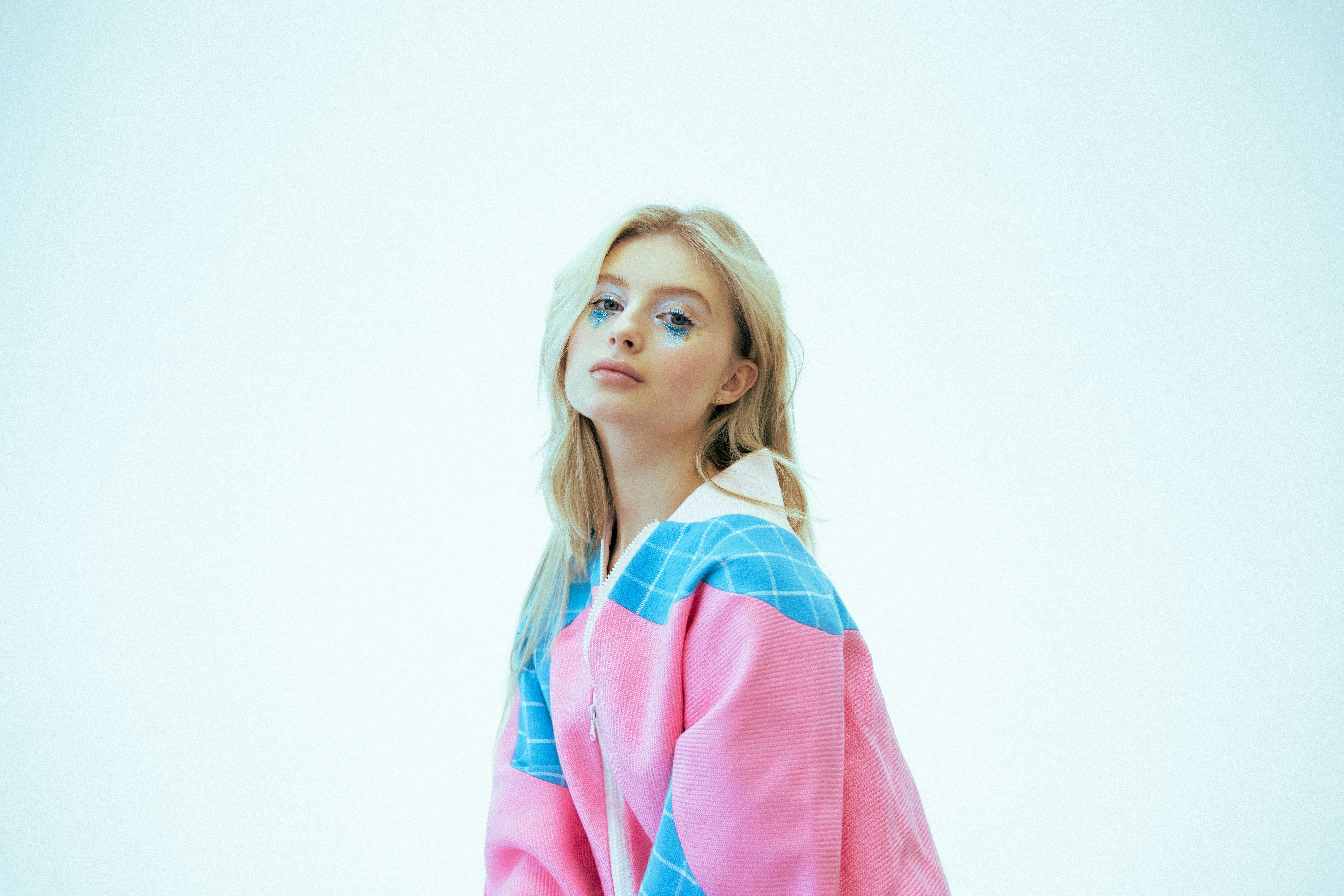 Pastel Pulse: A Gentle Portrait in Neon Pink and Sky