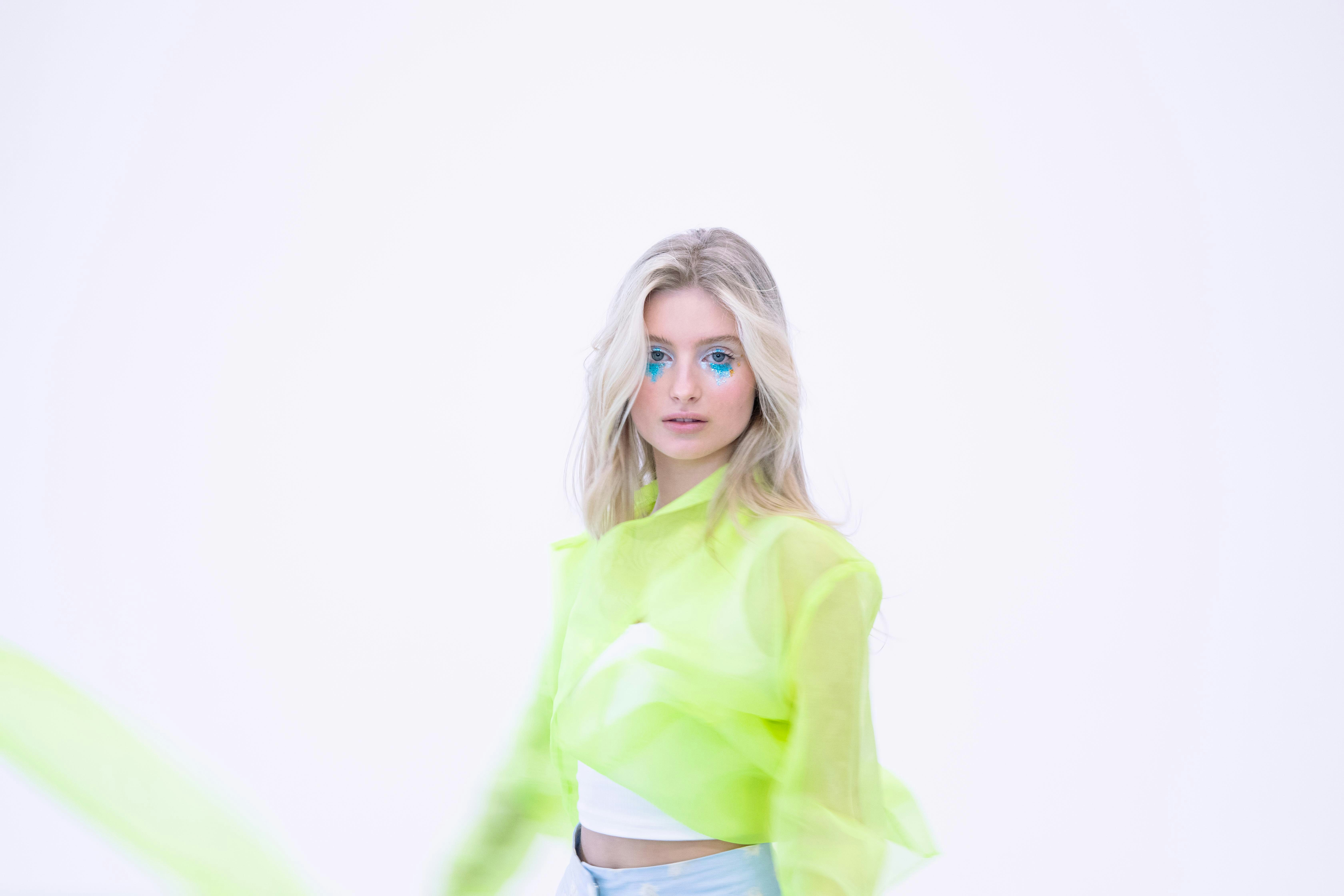 Neon Sheen: A Neon-tinged Portrait in Soft Light