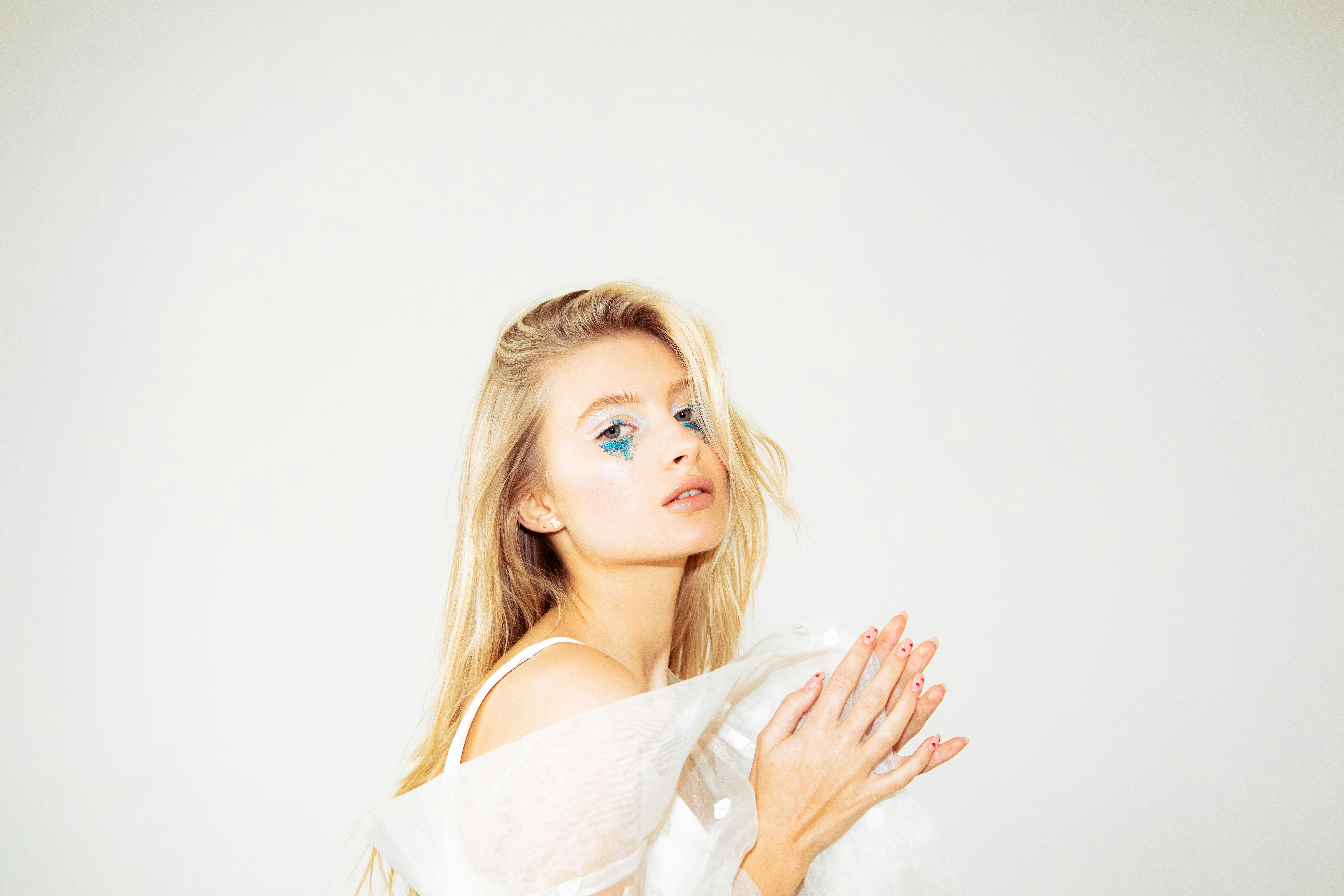 Blonde Grace in Soft Light