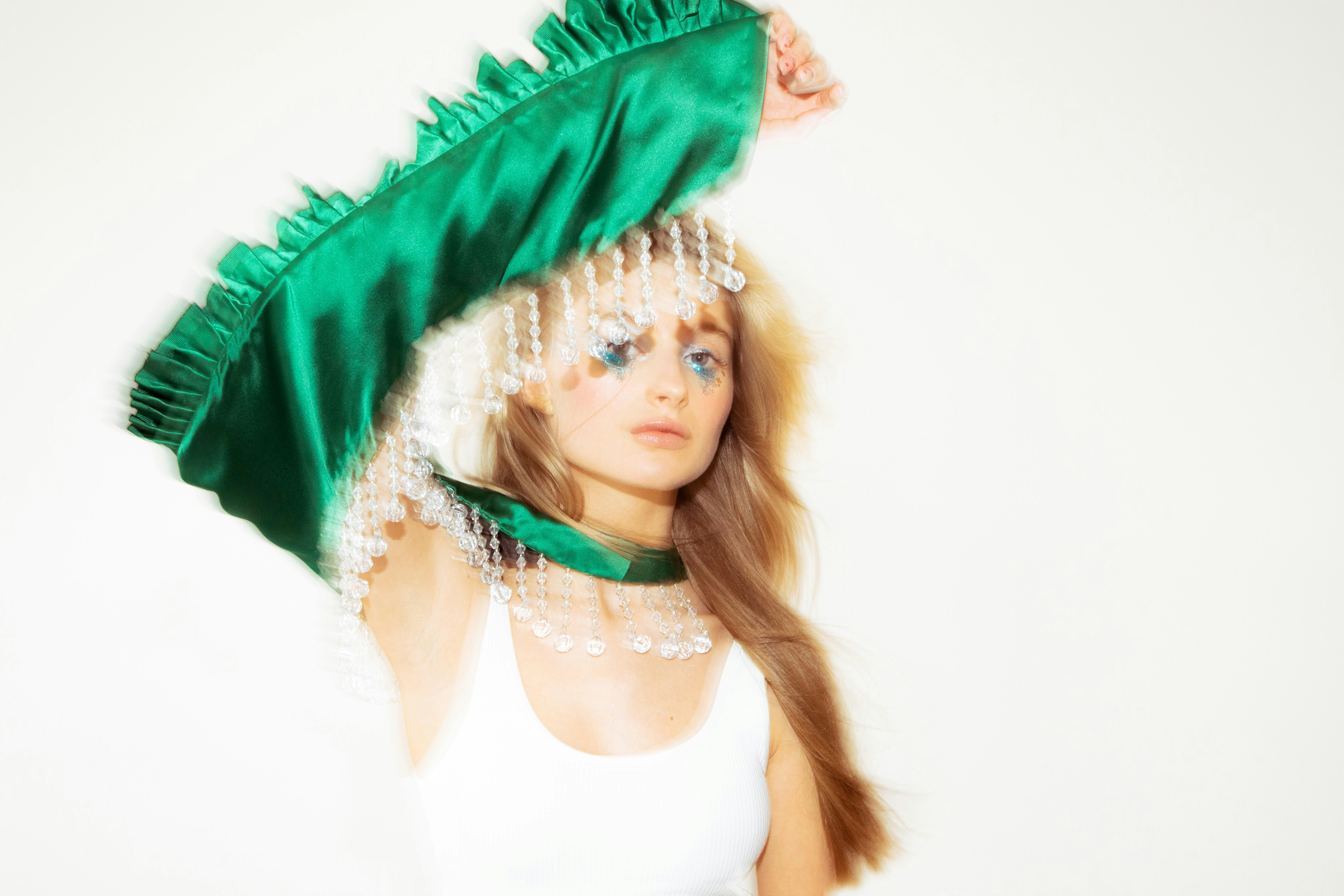 Emerald Veil: A Dreamlike Portrait in White and Silk