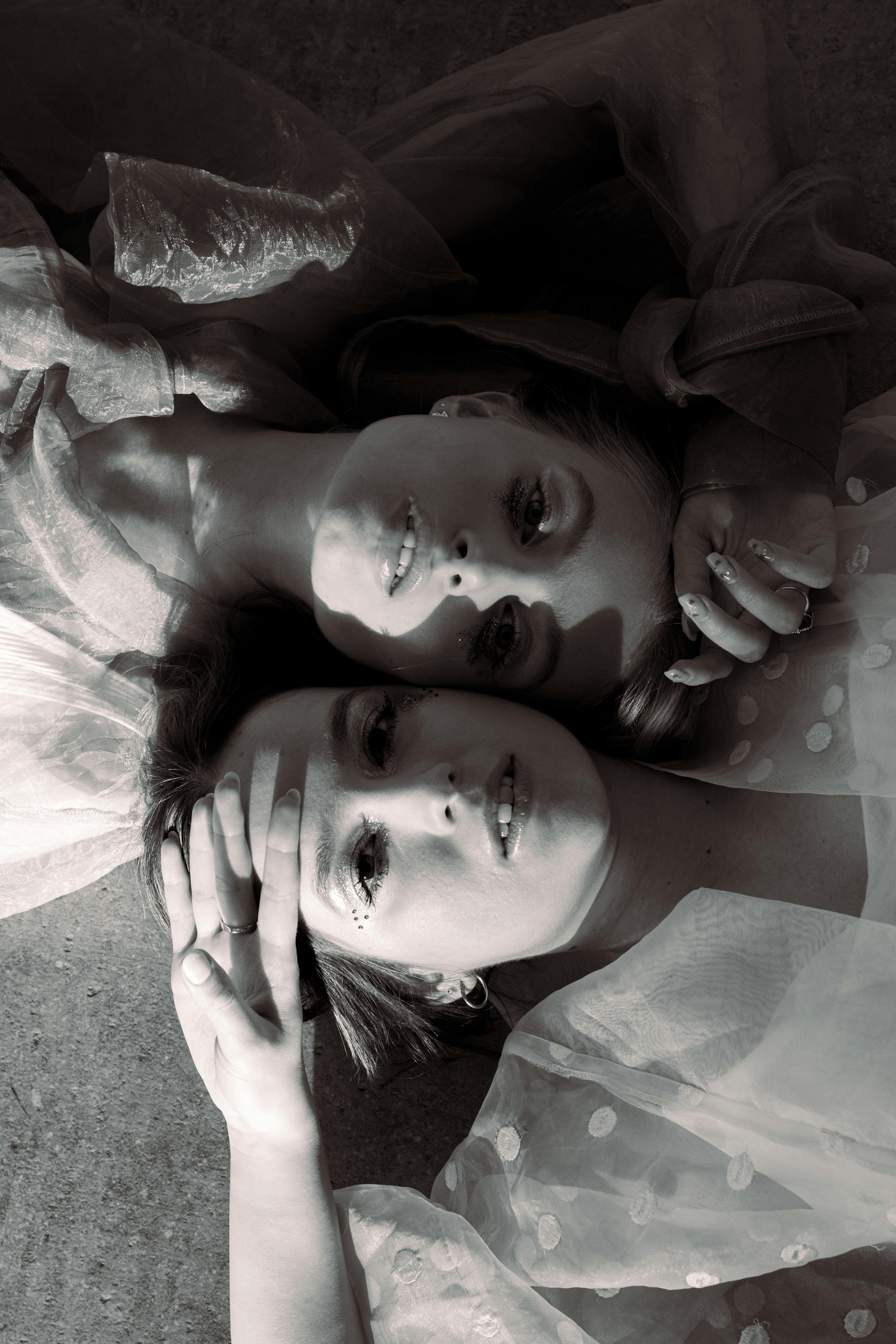 Twin Gazes Under Veiled Light
