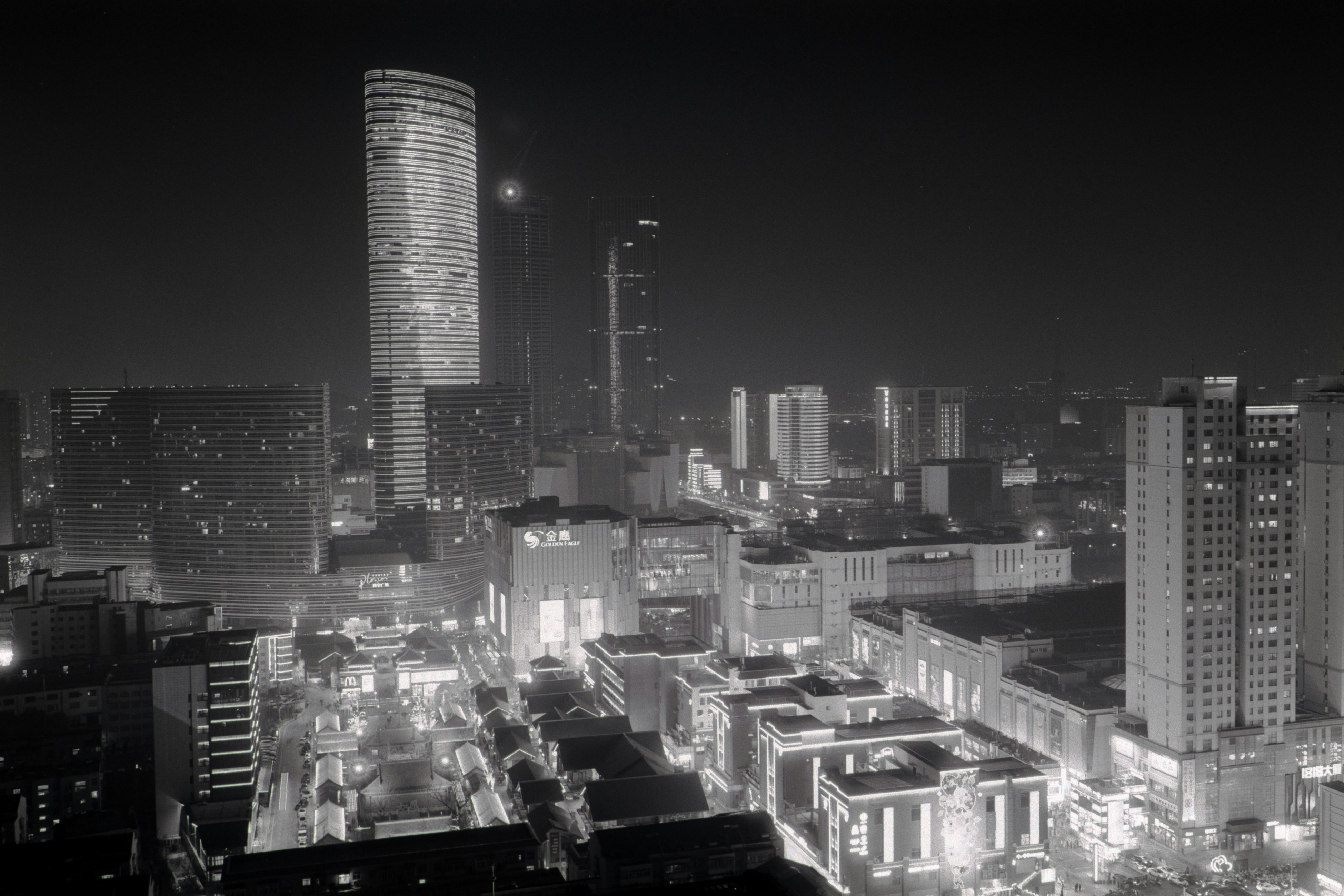 Midnight Tower Glow: A Quiet Cityscape Under Urban Stars