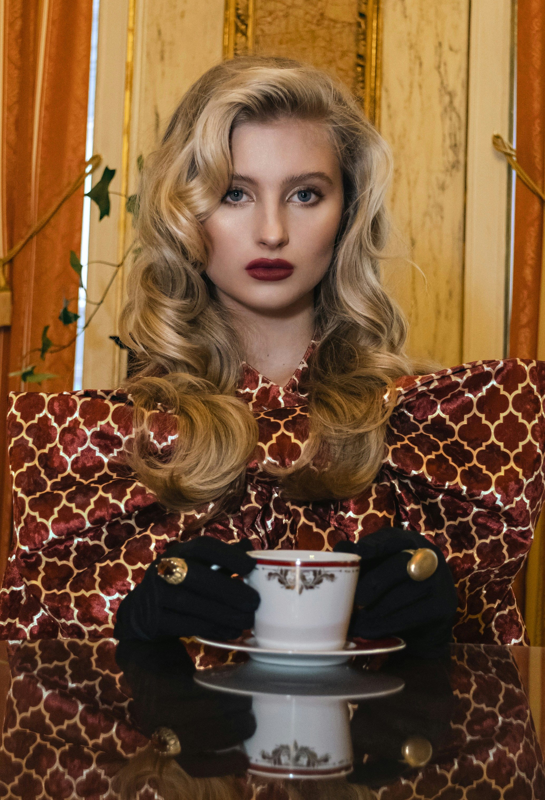 Gold Velvet Glamour: A Regal Tea Portrait
