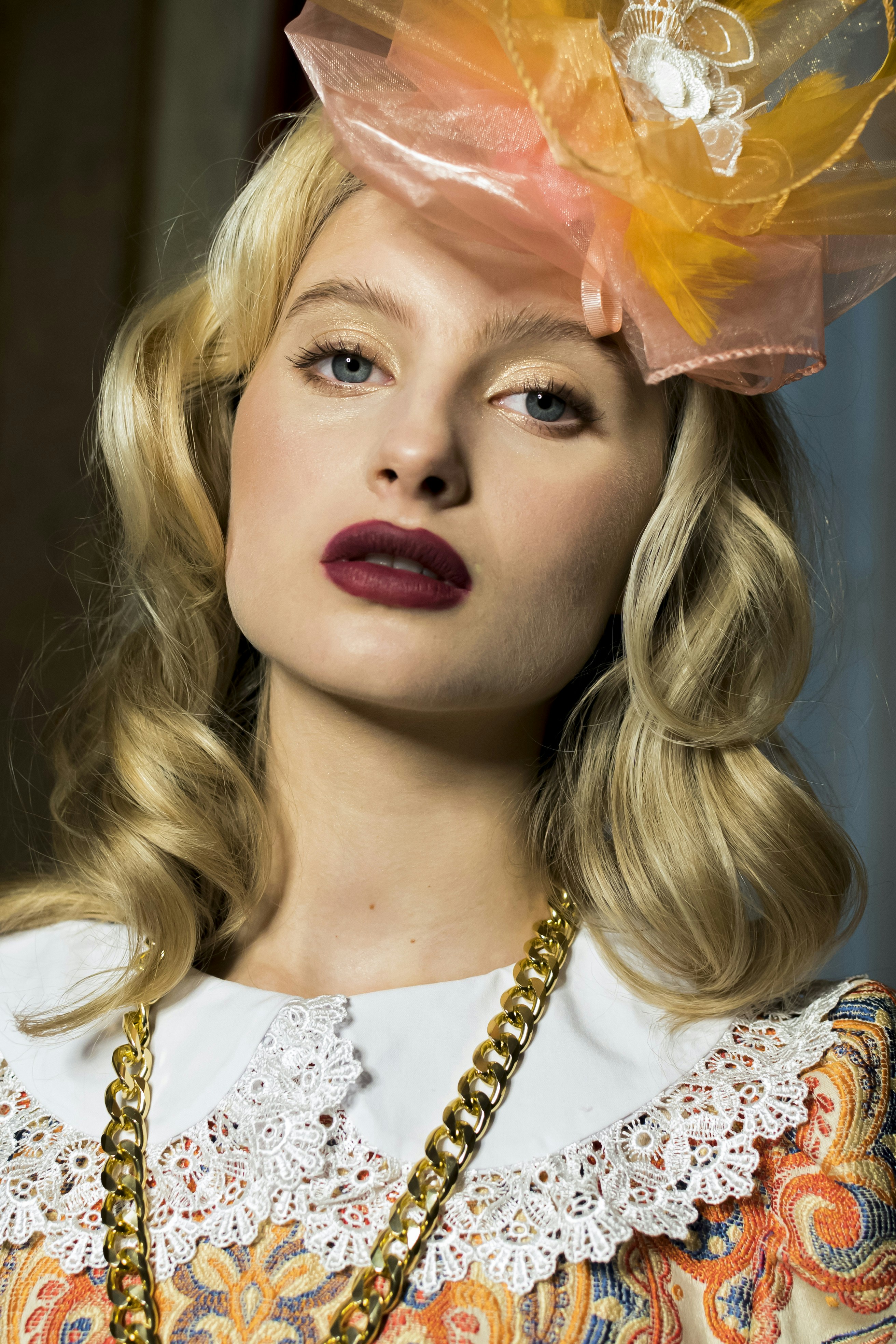 Blonde Elegance: A Portrait in Velvet Lip and Veil