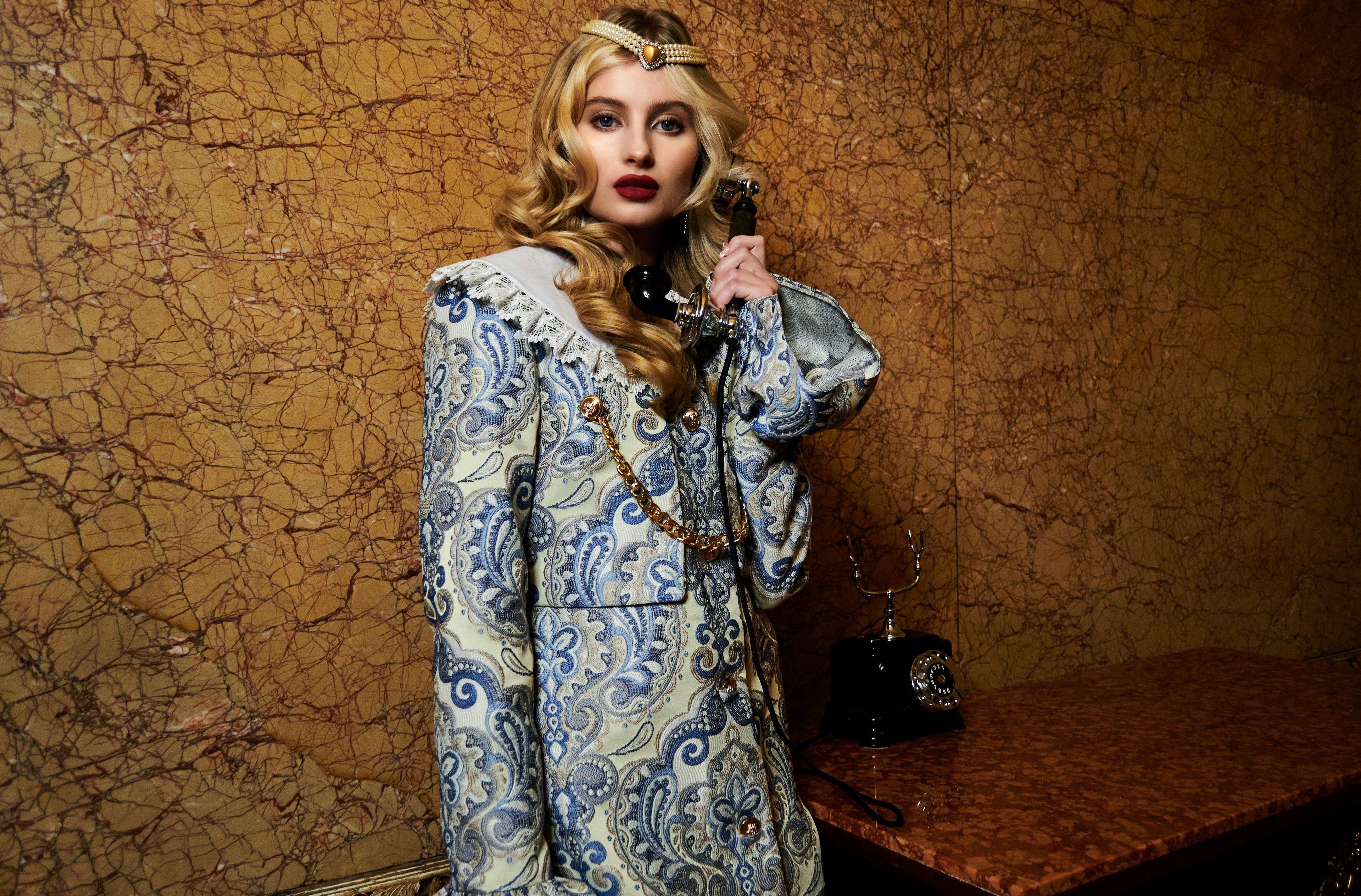Art Deco Grace: A Blonde Icon in Ornate Paisley