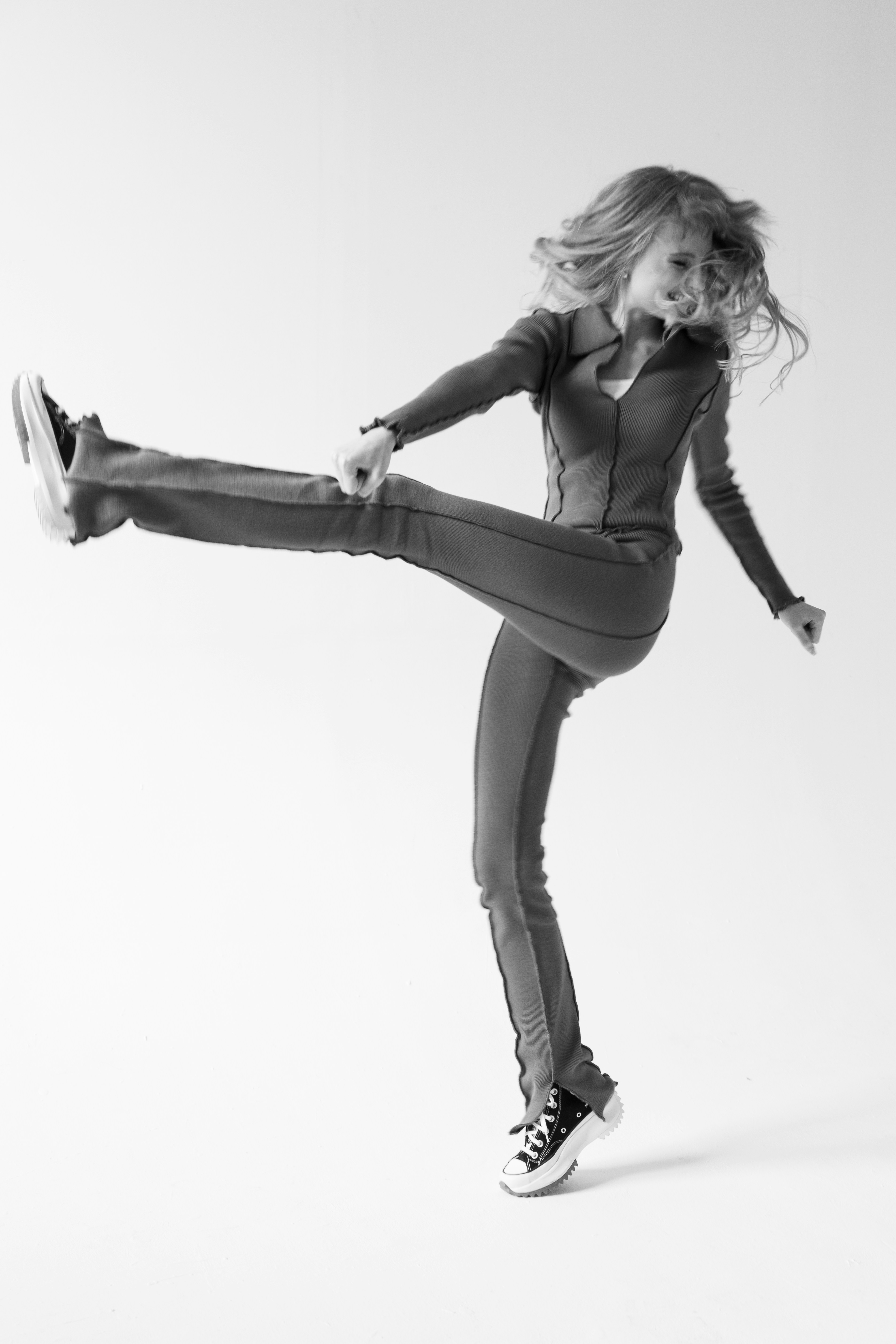 Kick in Motion: A Dynamic Black-and-White Portrait of Movement