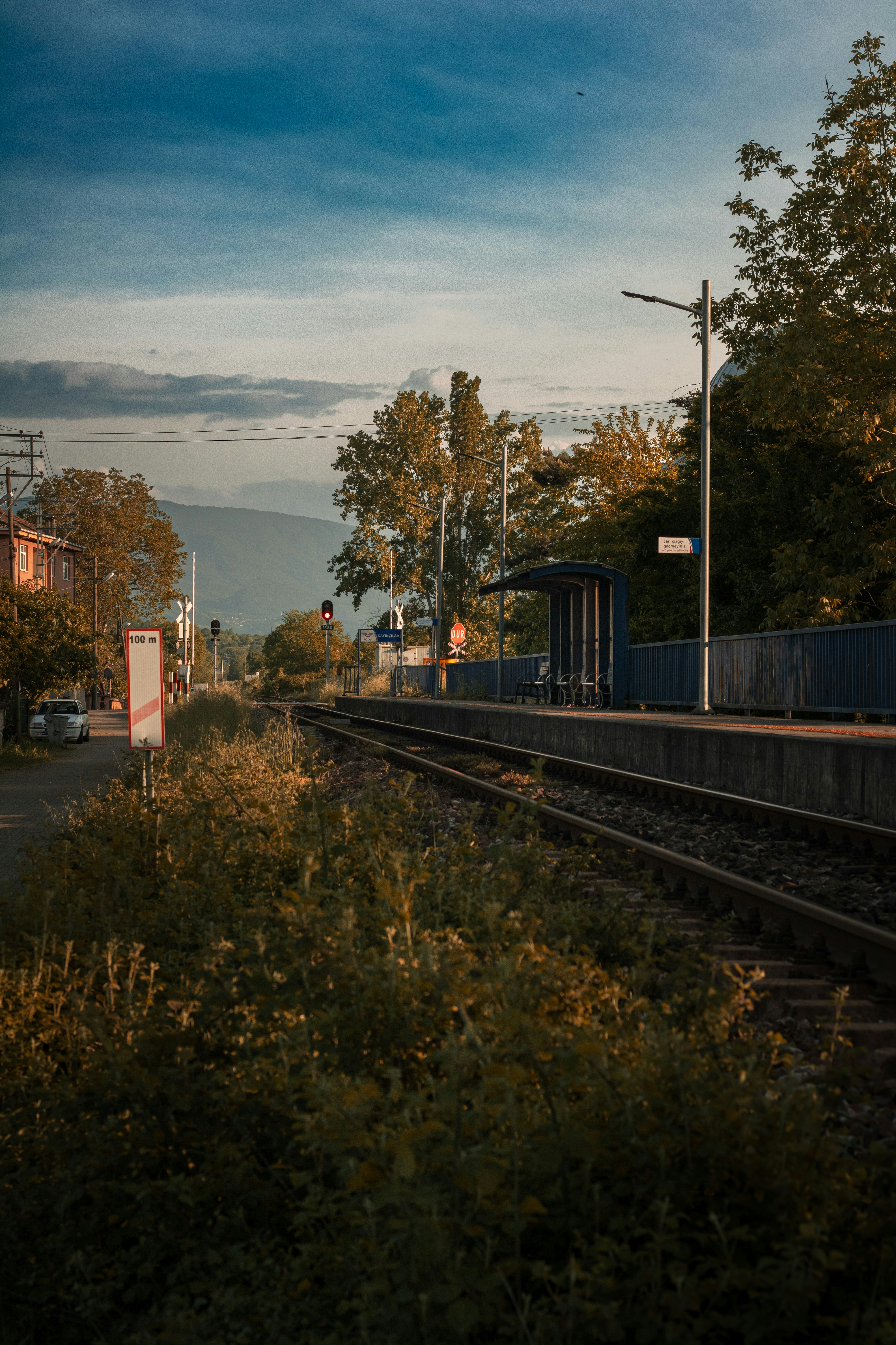 Sunlit Platform Quiet on the Suburban Rail