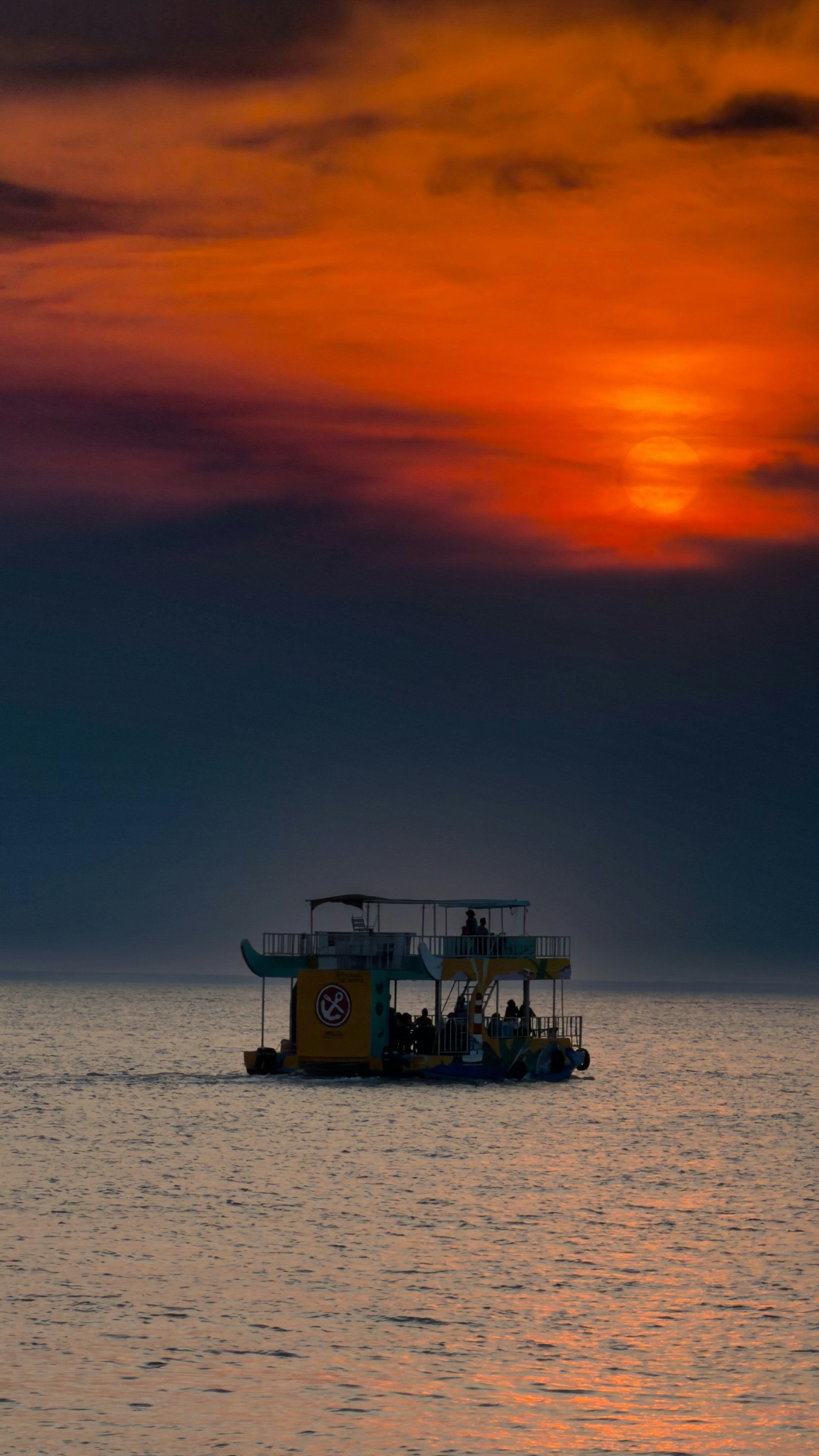 Sunset to Sea: A Quiet Excursion Beneath a Fiery Sky