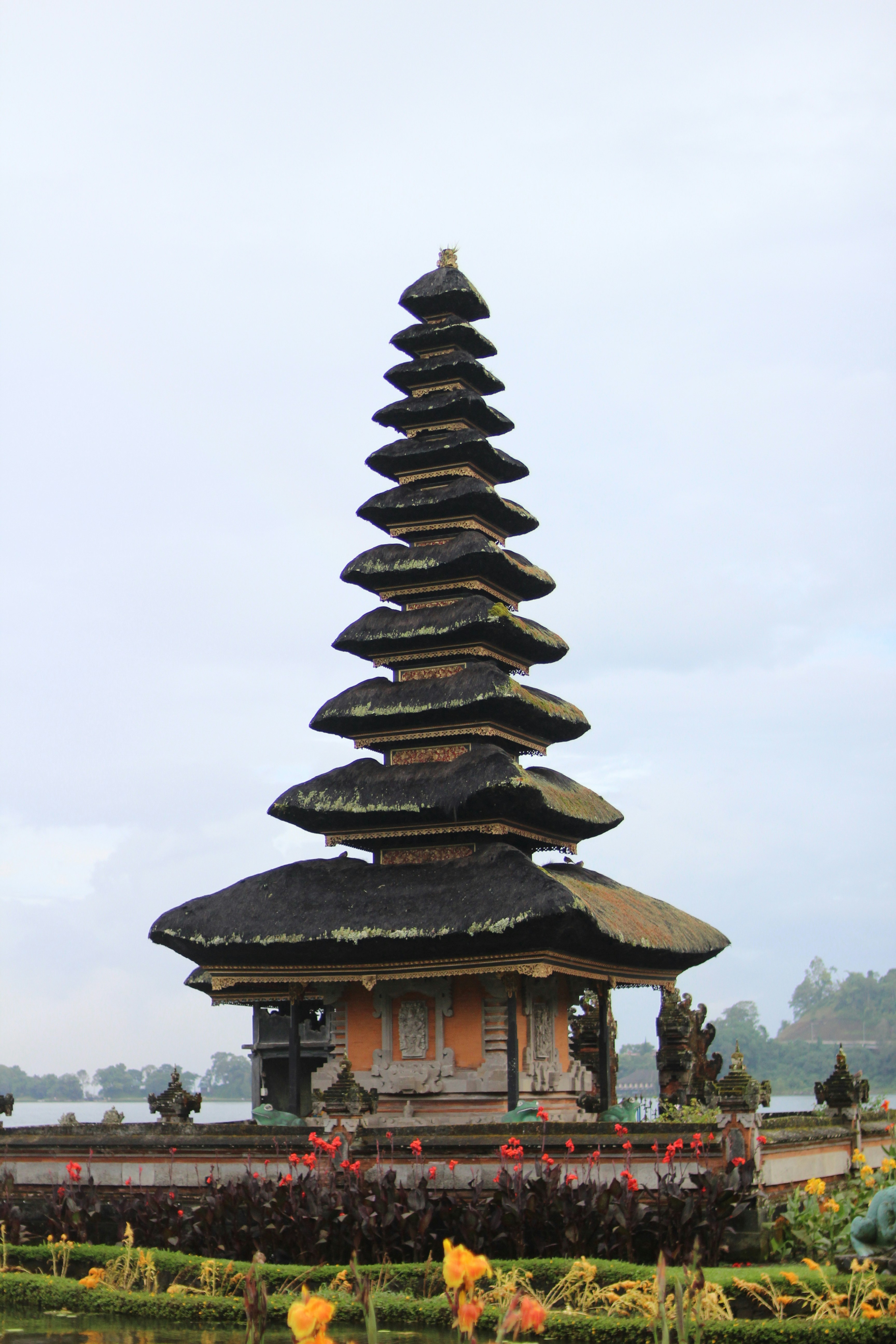 Stone-tiered Temple Rising from a tranquil pond