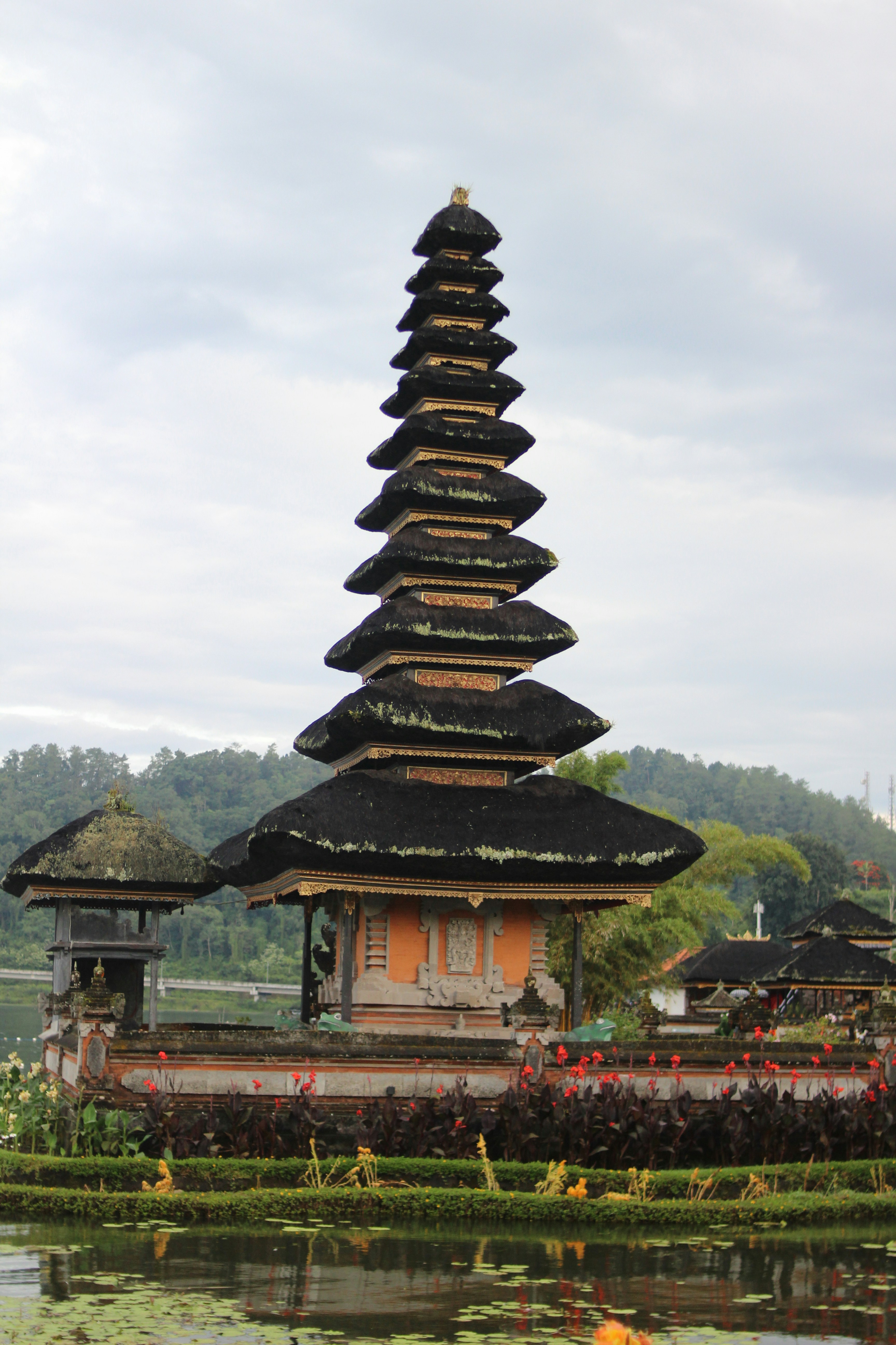 Silhouette Pagoda Rising Over a Reflective Lake Garden