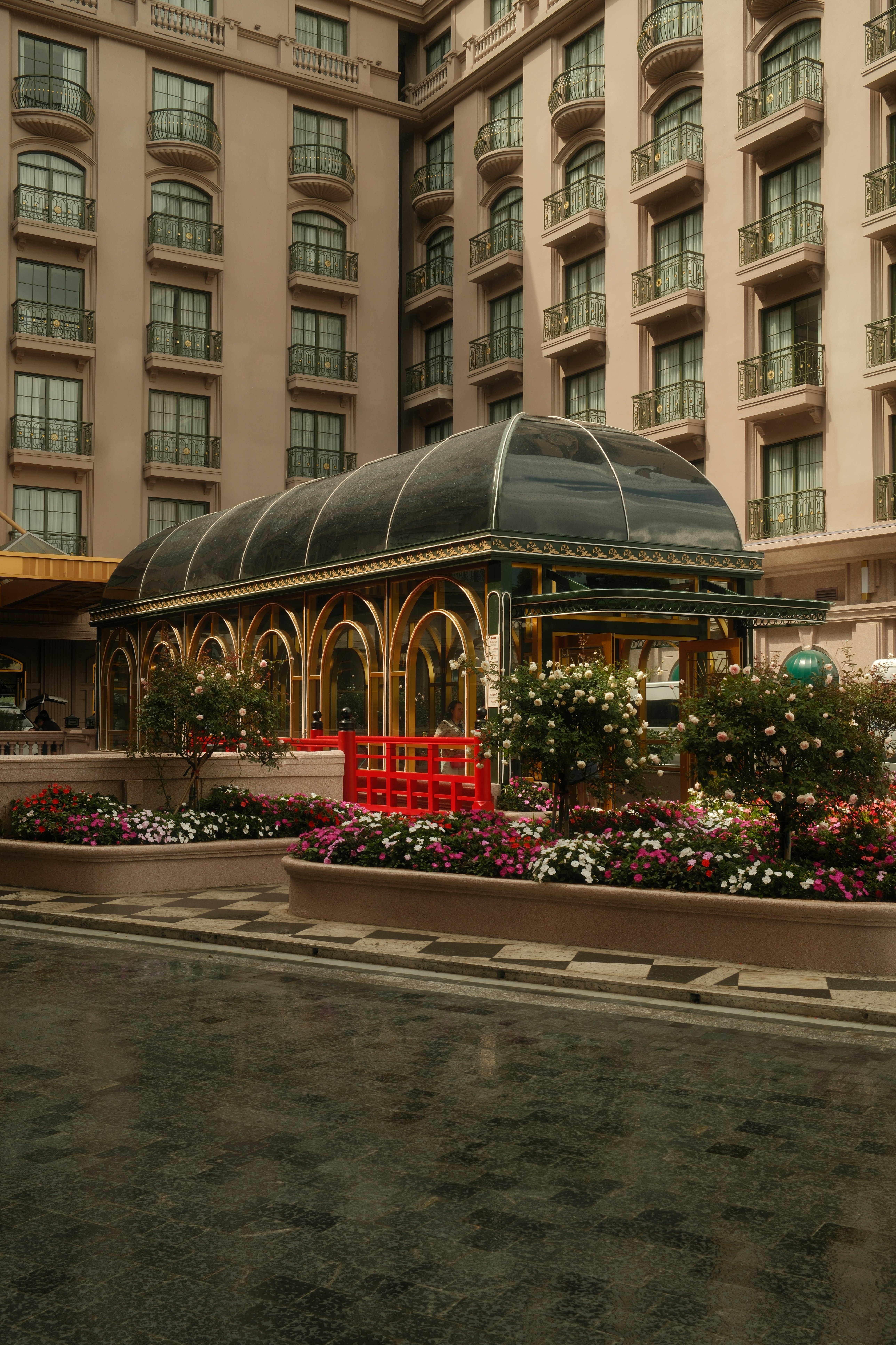 Hotel Entrance Conservatory with Blooming Planters