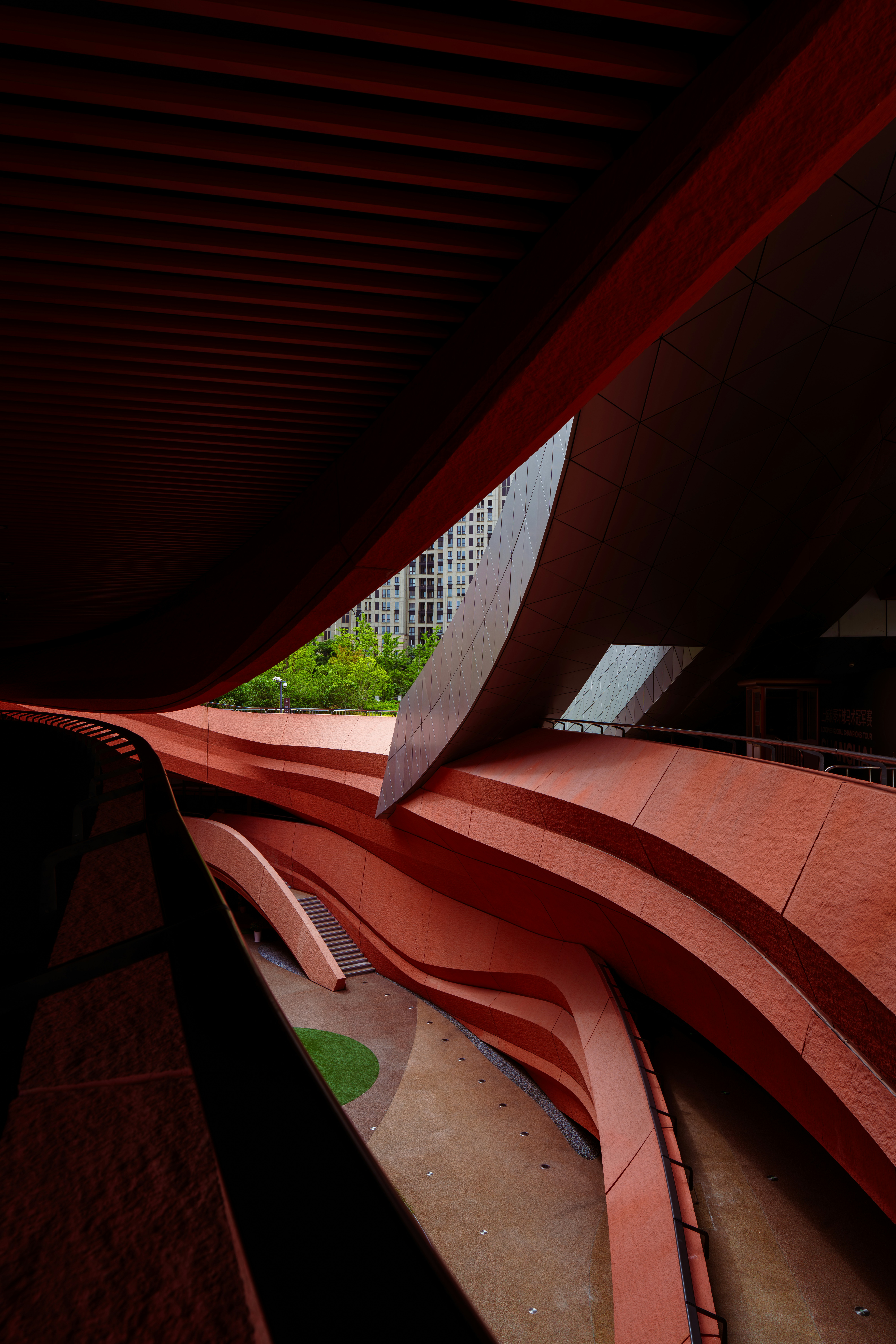 Red Curves, Blue Sky: An Urban Sonata of Concrete Waves