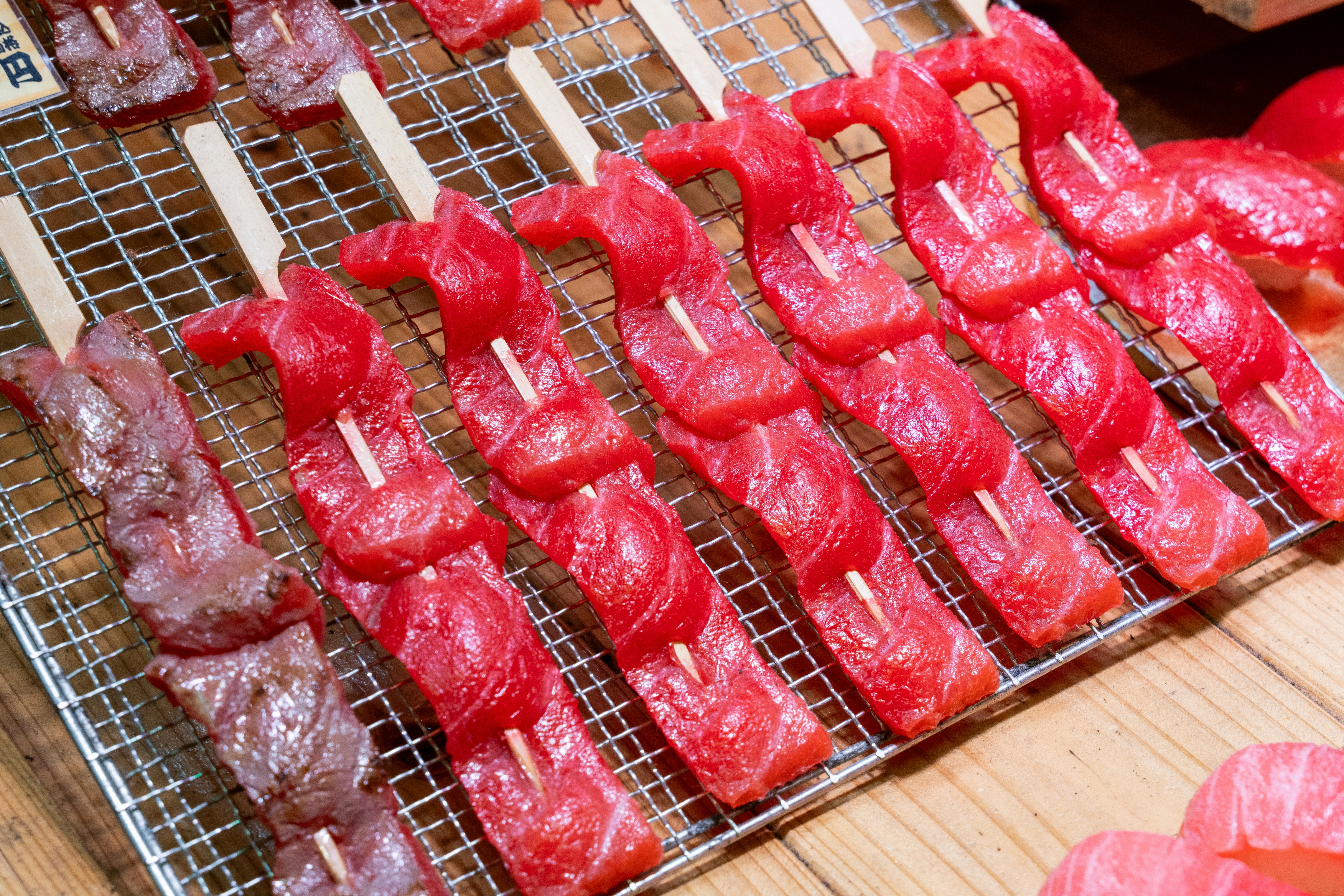 Red Skewers on a Cooling Rack: A Bite-Sized Grilling Parade