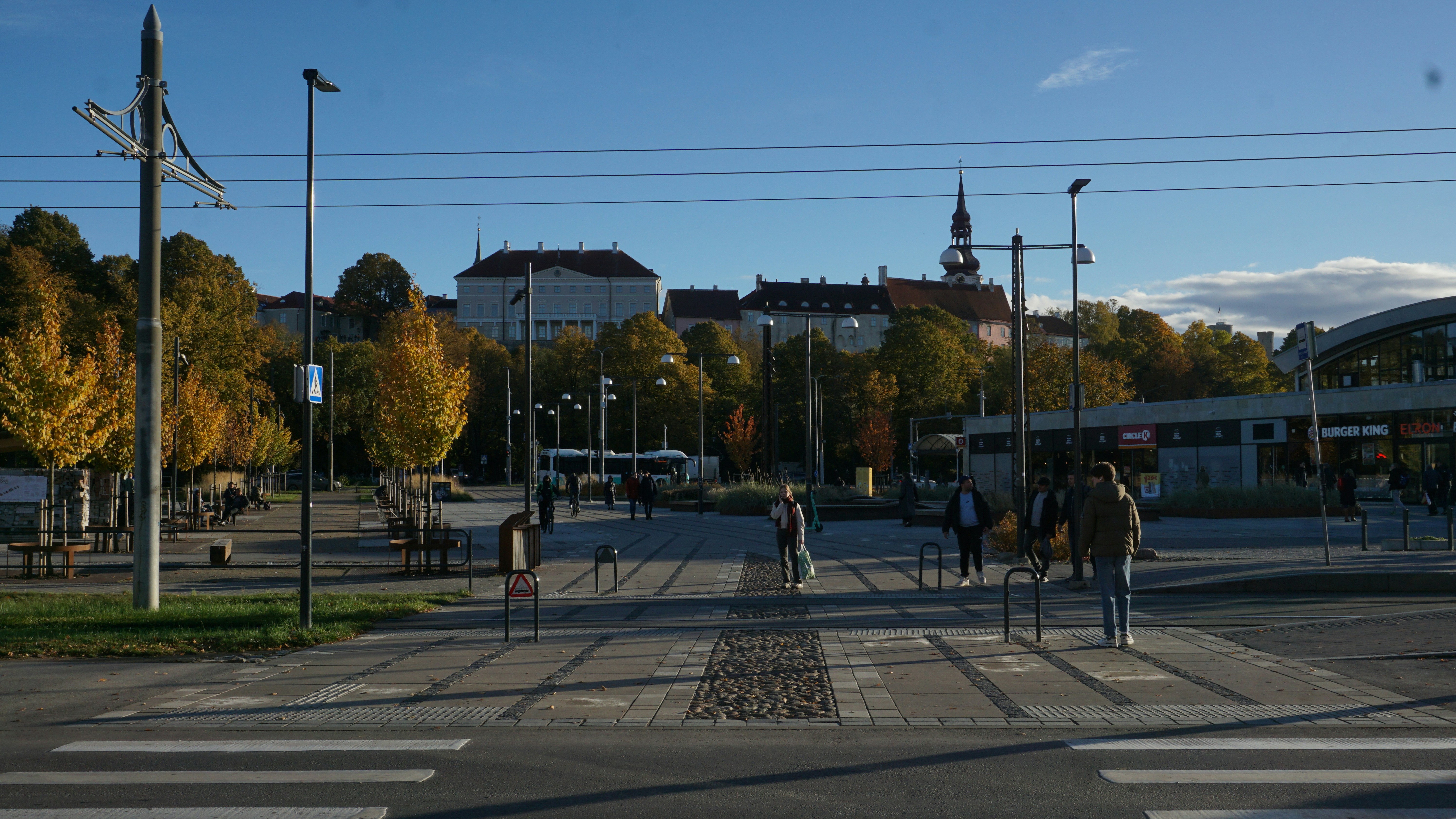 City Square Dawn: Autumn Light Across a Quiet Stationfront