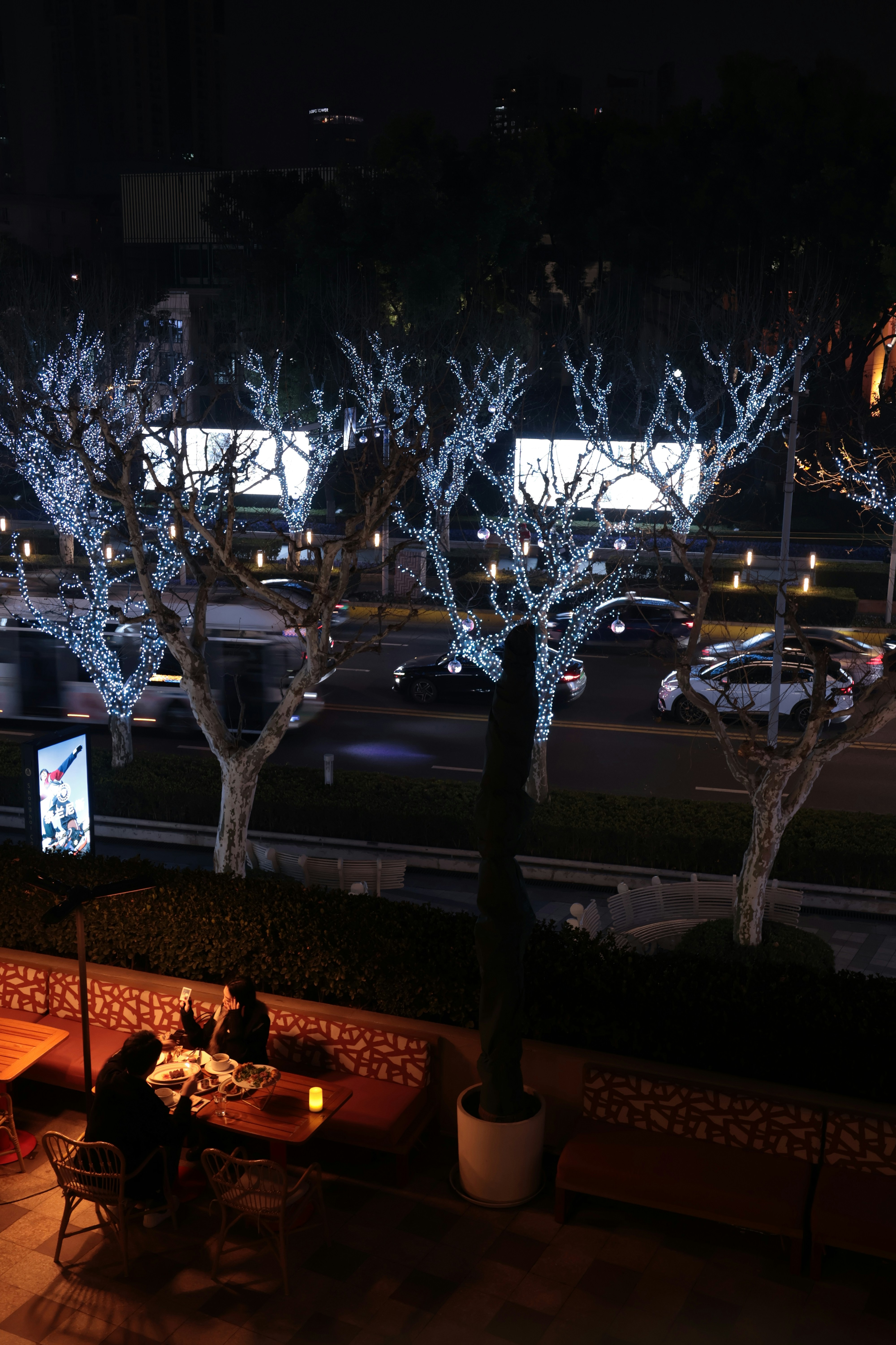 Night Bistro Under Neon-Bloomed Trees