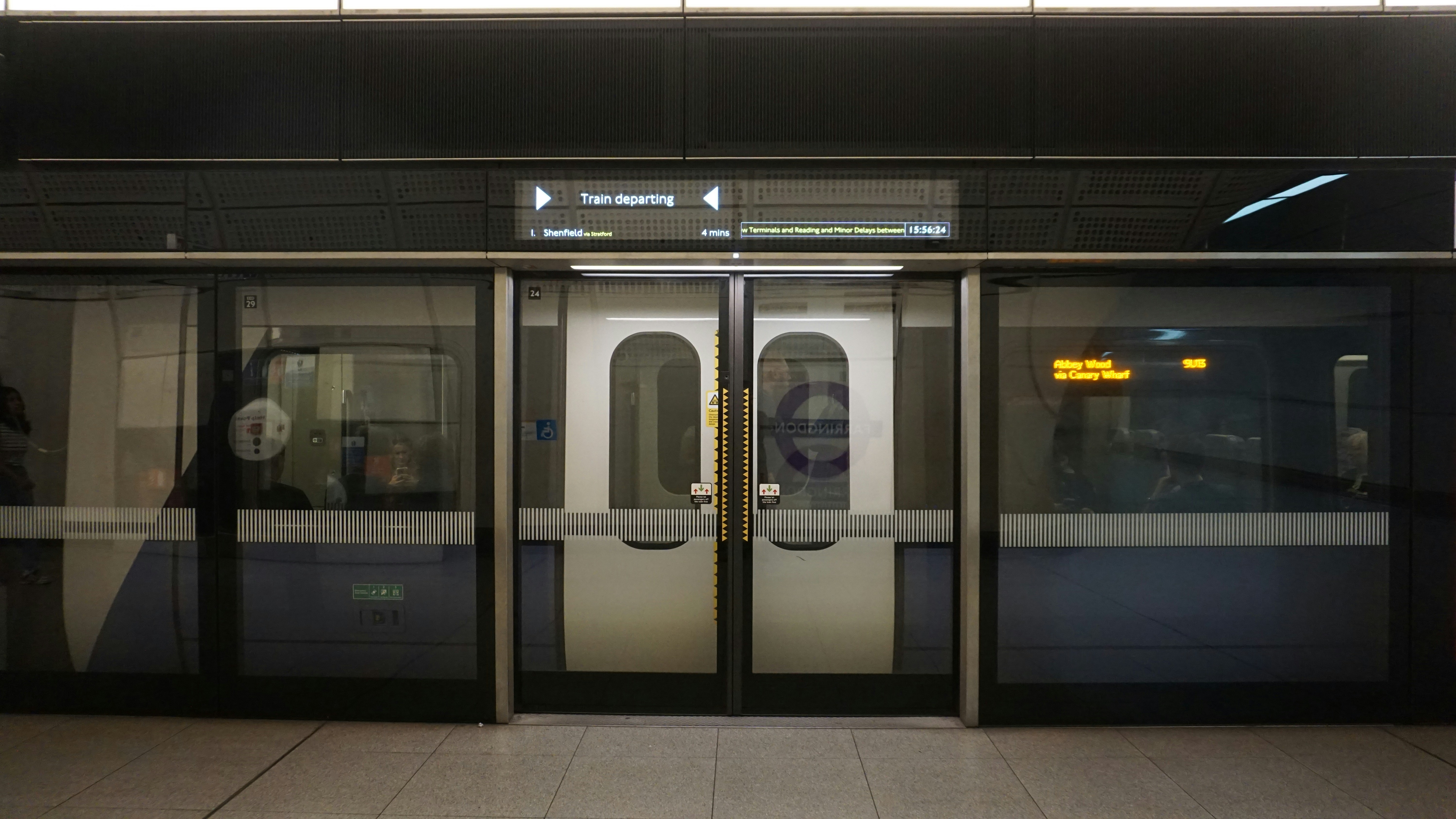 Midnight Carriage: Dual Doors Framed by Quiet Platform
