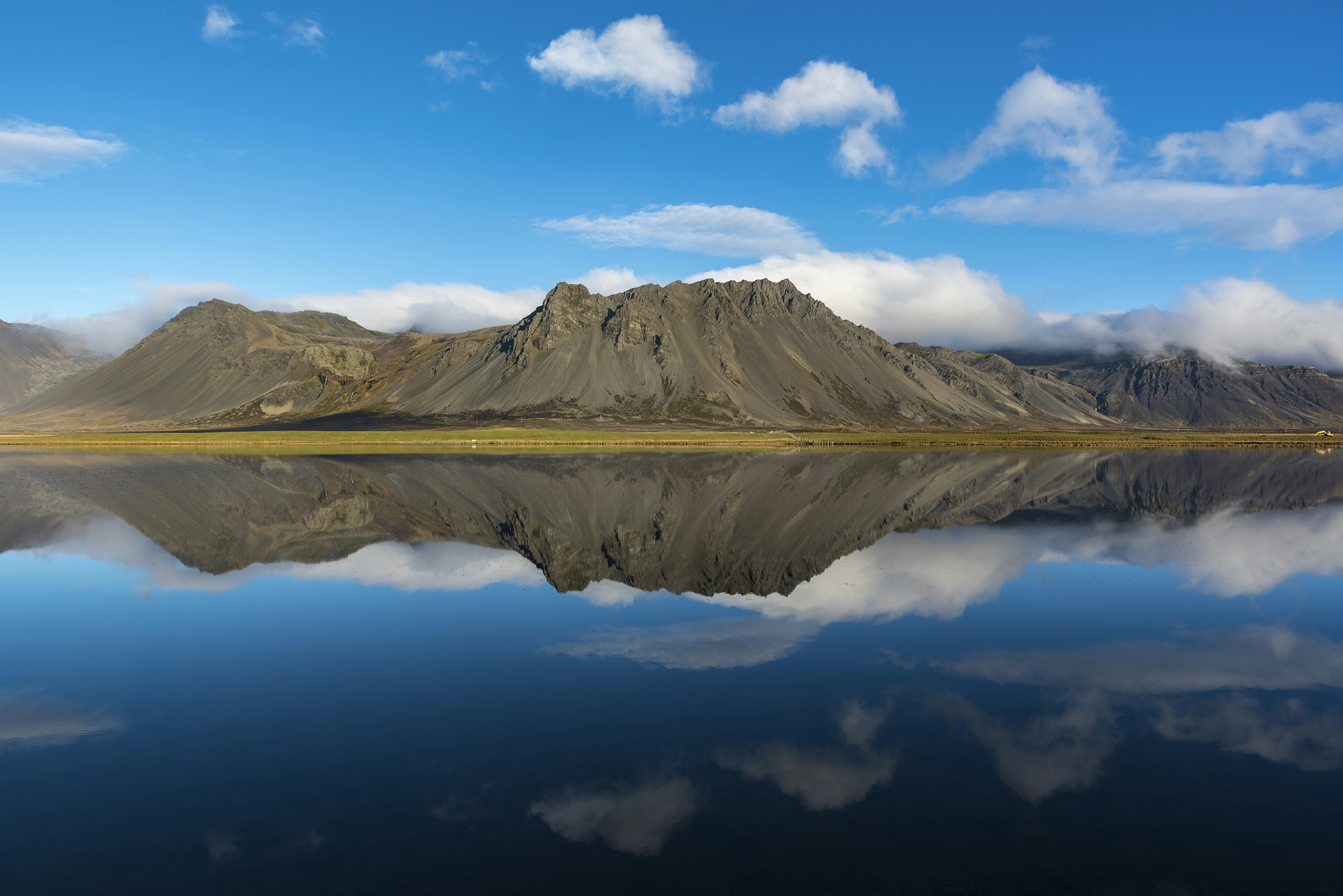 Twin Peaks in Glass: A Mountain Range Reflected in A Pristine Lake