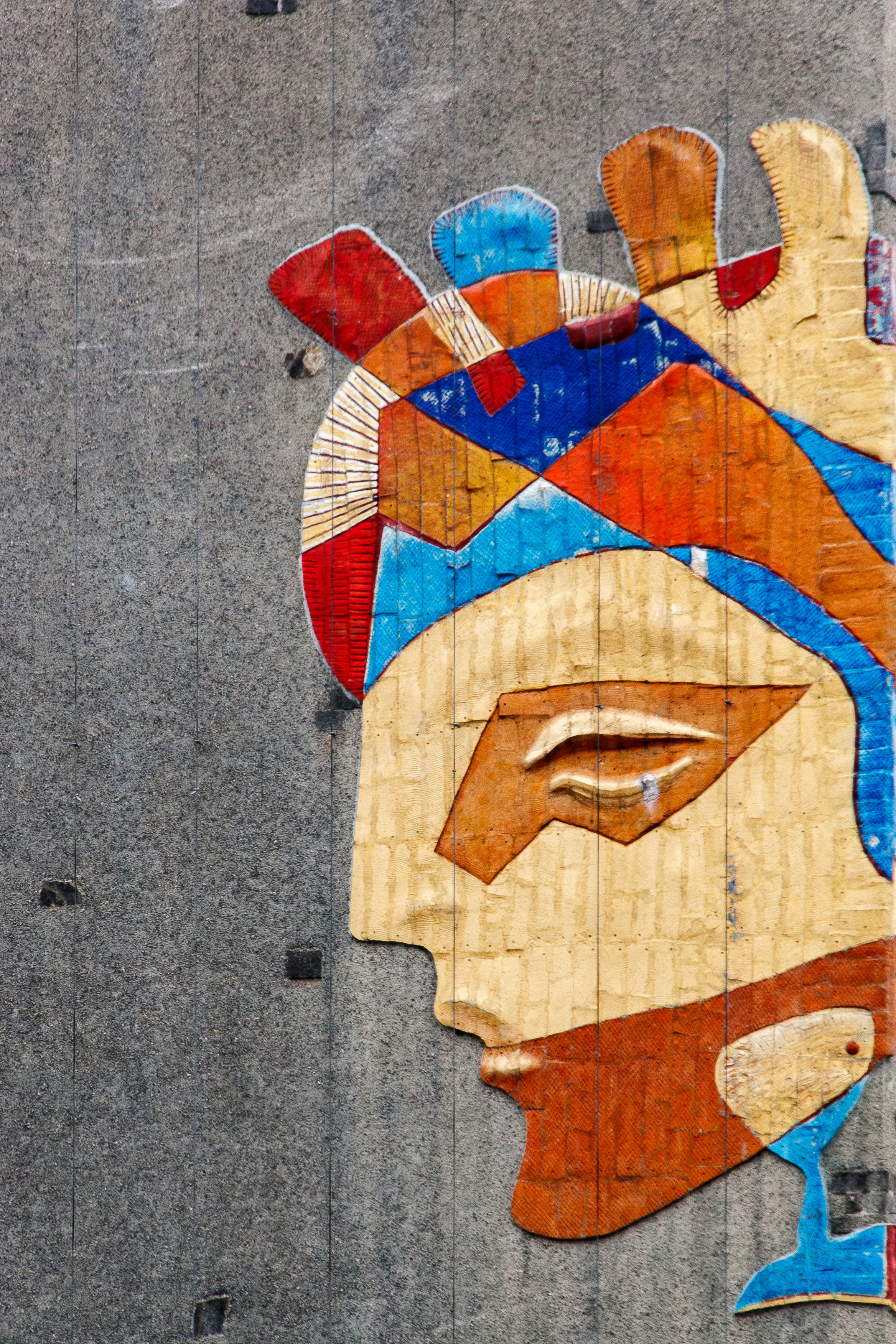 Colorful Street Mosaic Portrait on Concrete Wall