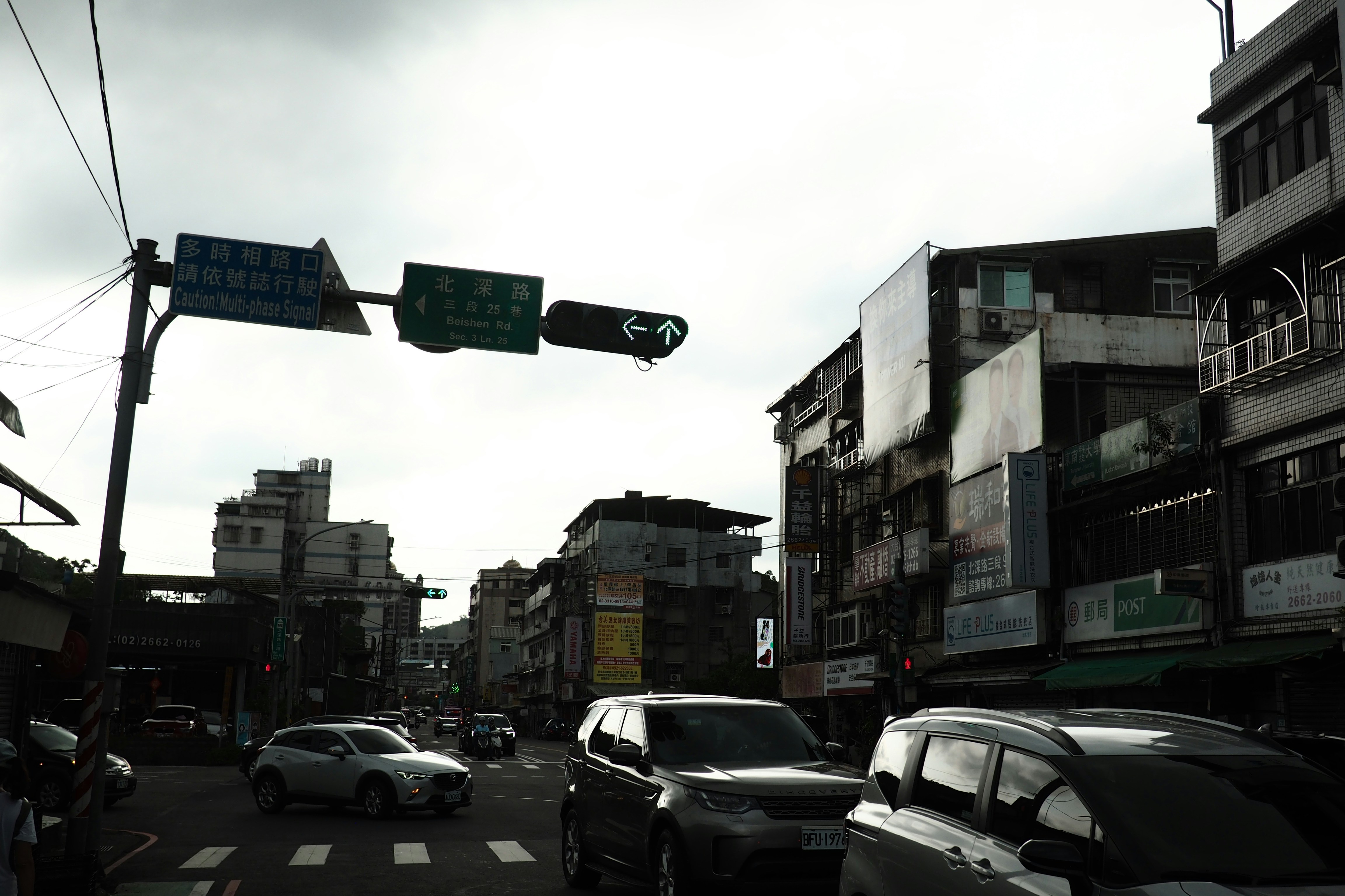 Urban Crossroads Under Overcast Skies