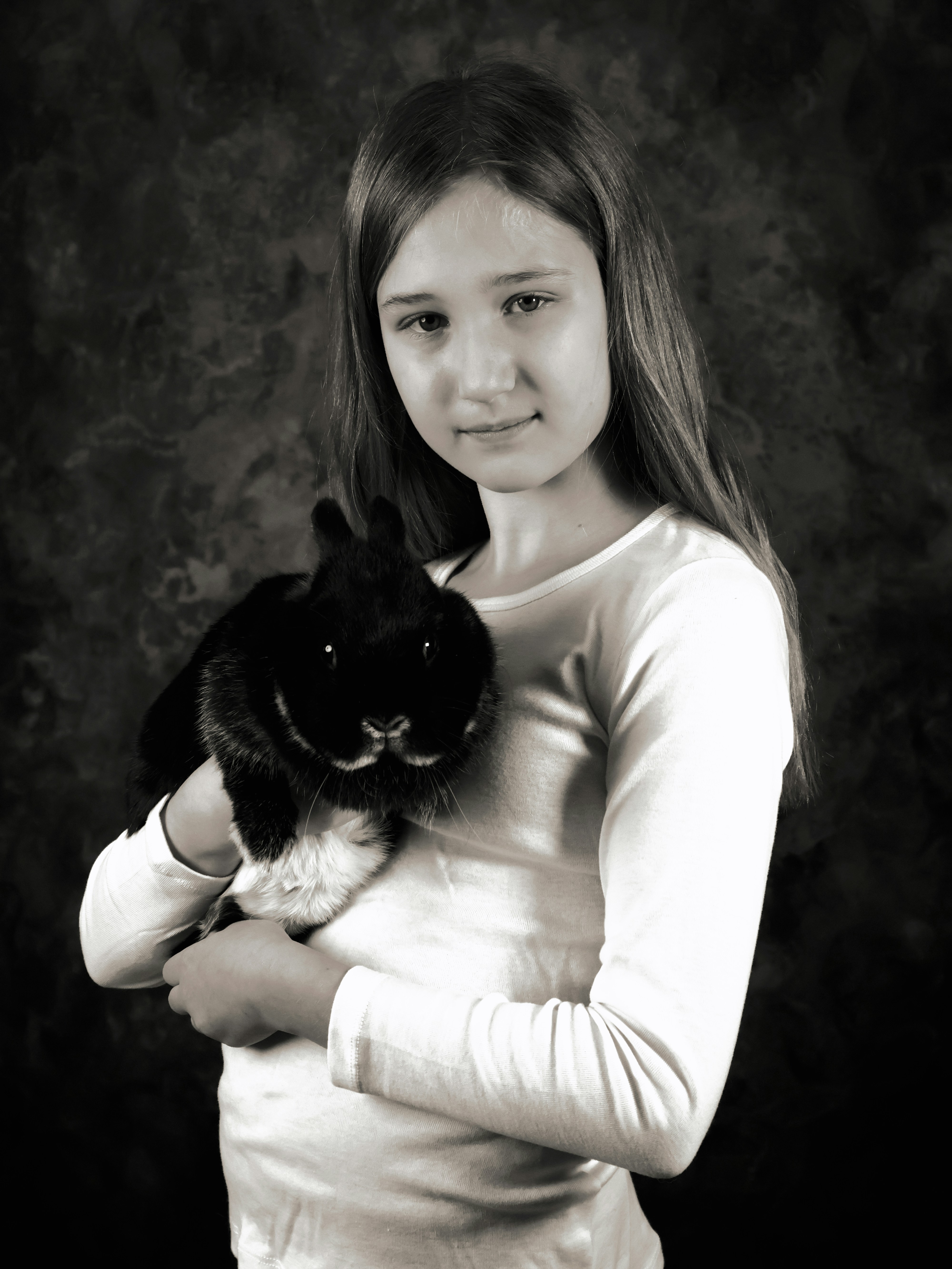 Quiet Bond: A Girl and Her Rabbit in Soft Studio Light
