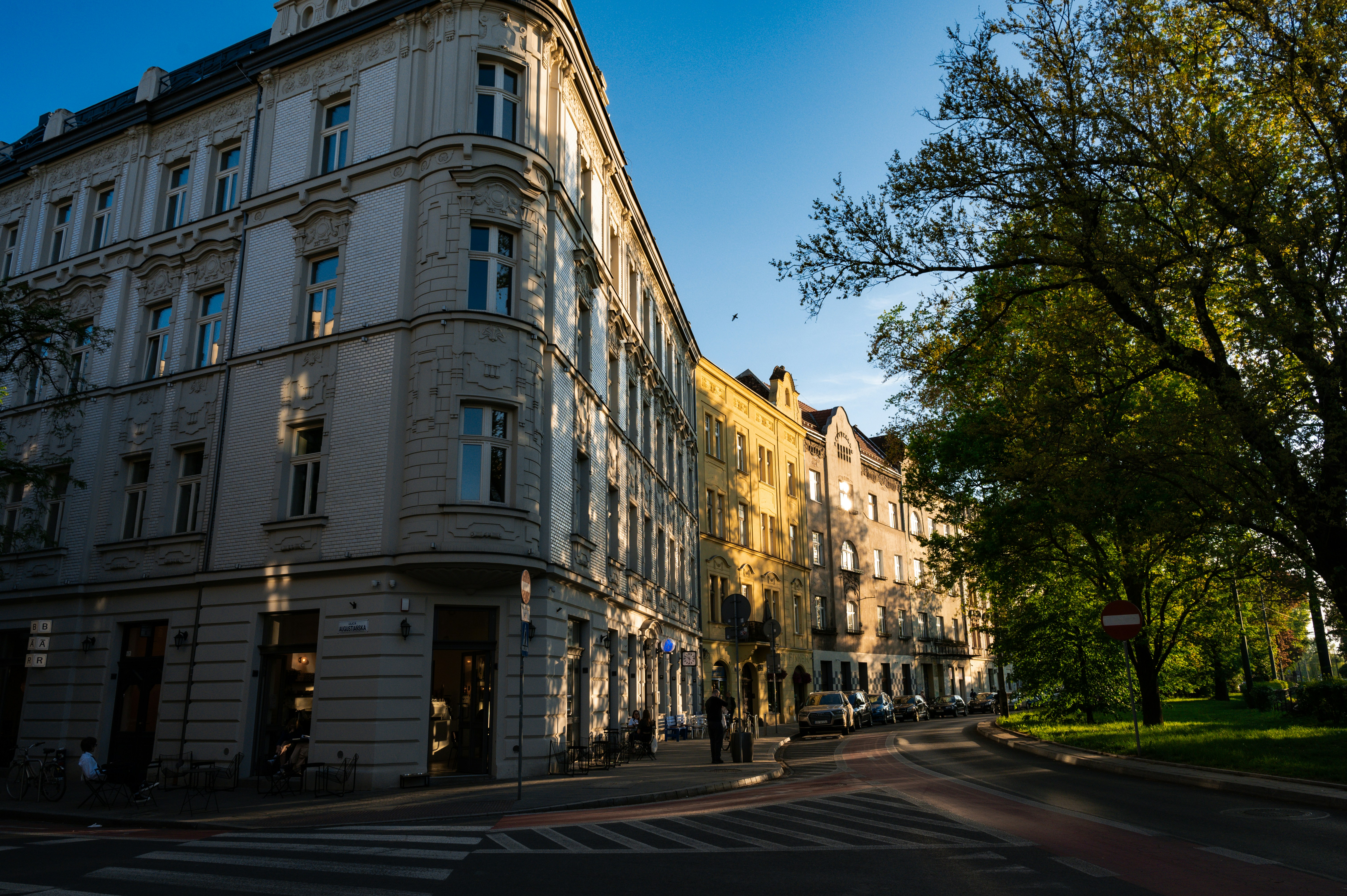 Sunlit Facades and Shadowed Street Glow