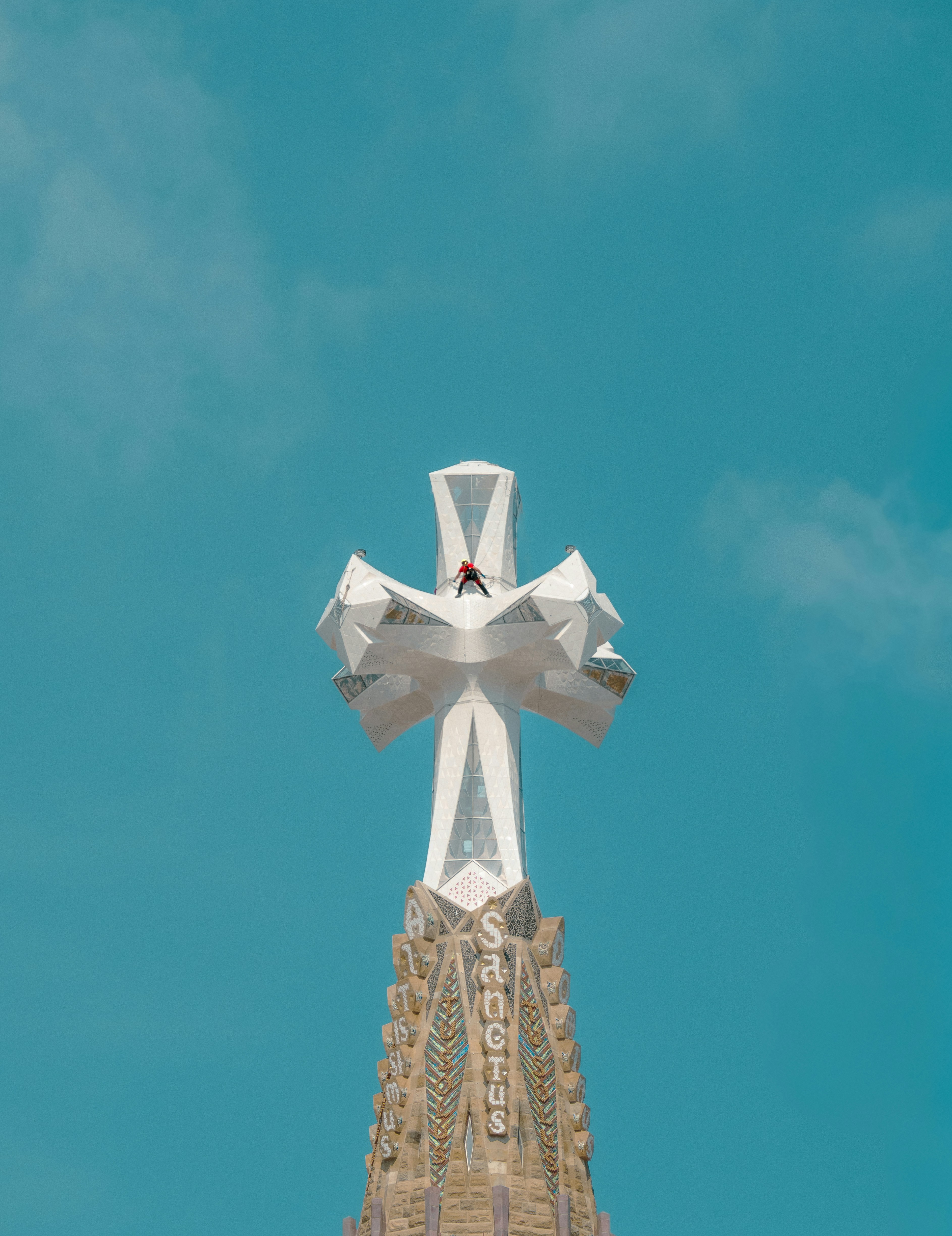 Skyward Icon: The Sacred Spire Illuminated Under a Clear Blue