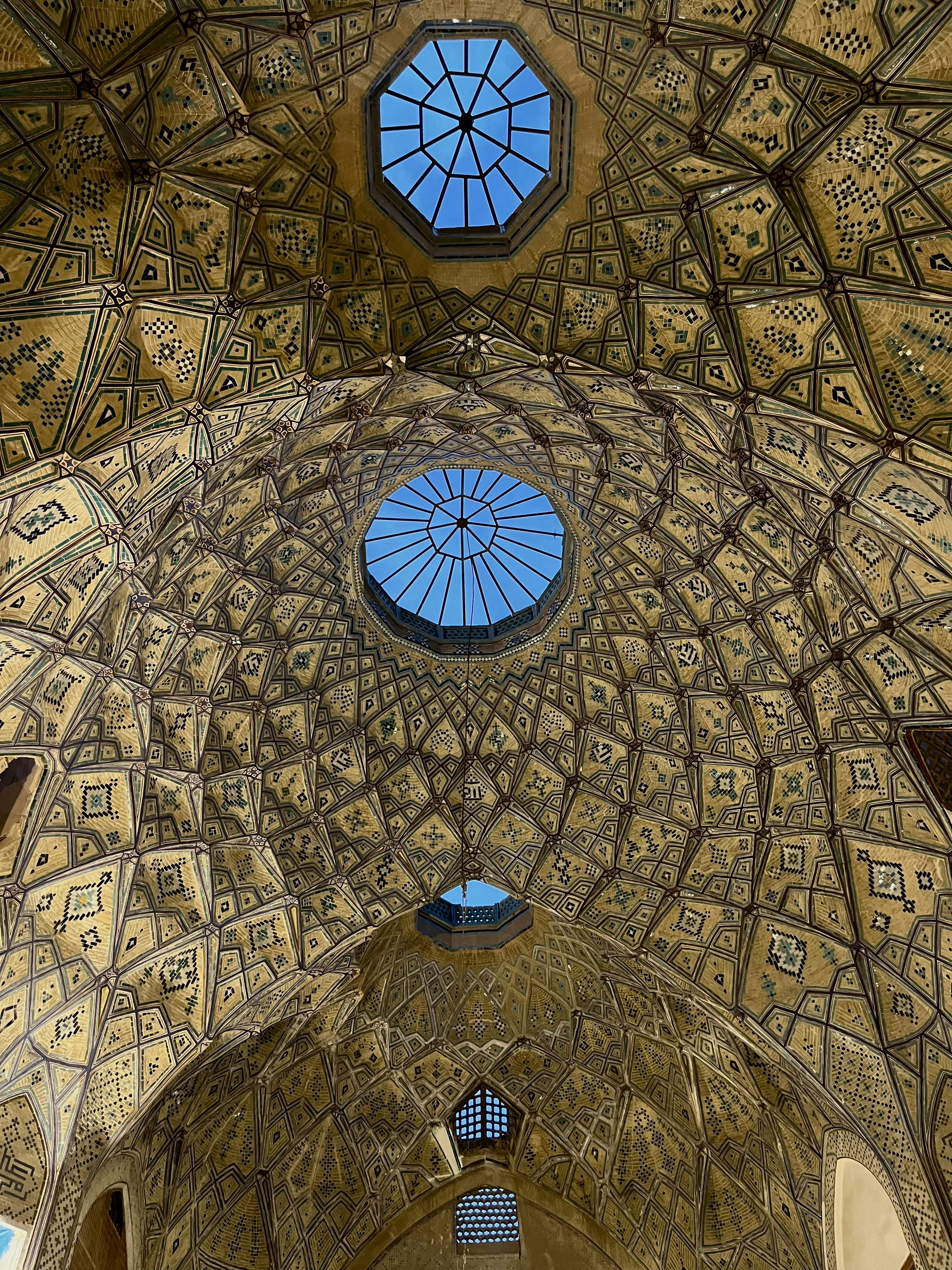 Skylight Vaults: A Teal Tapestry of Domed Symmetry