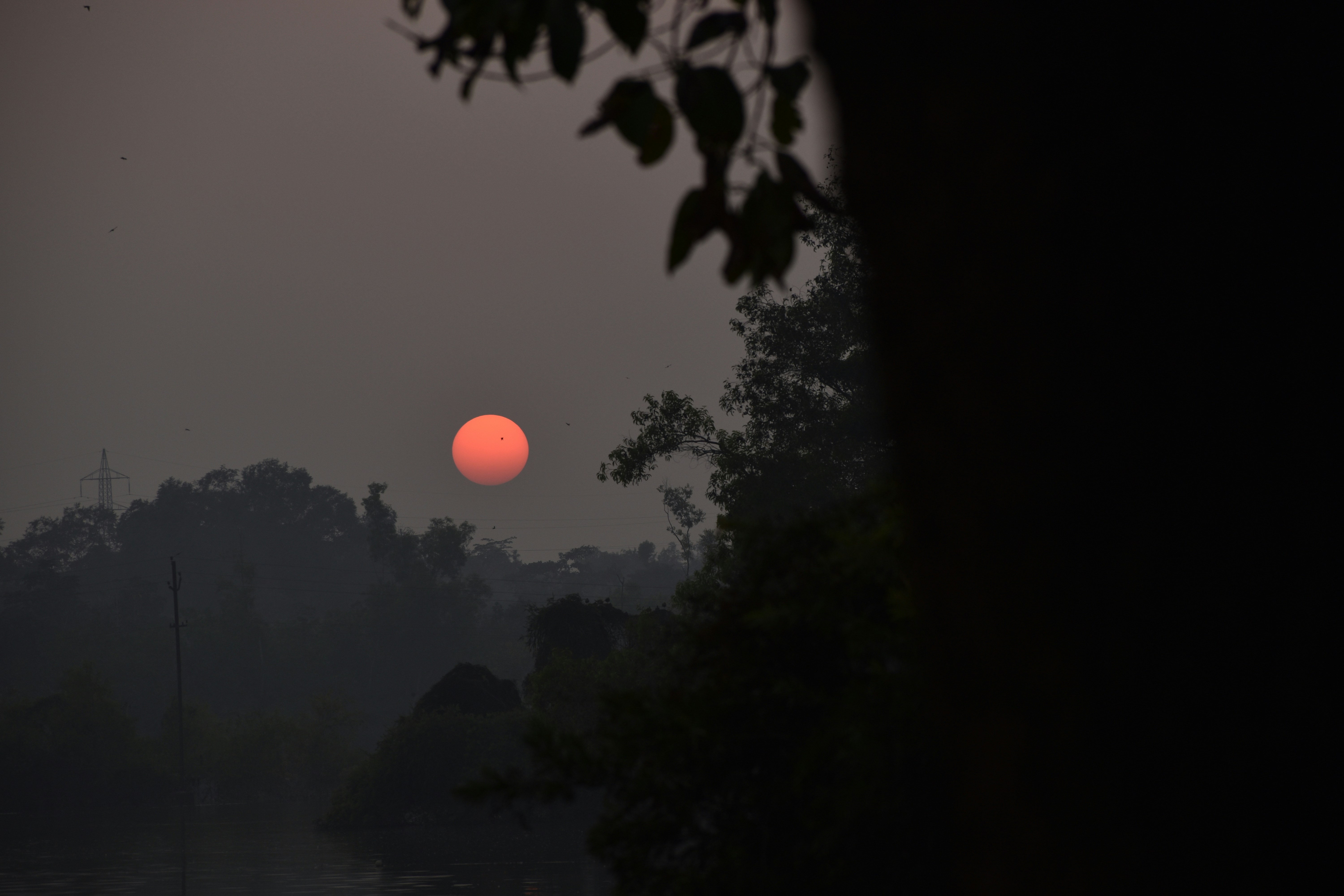 Dawn Red Orb Over Quiet Riverbend