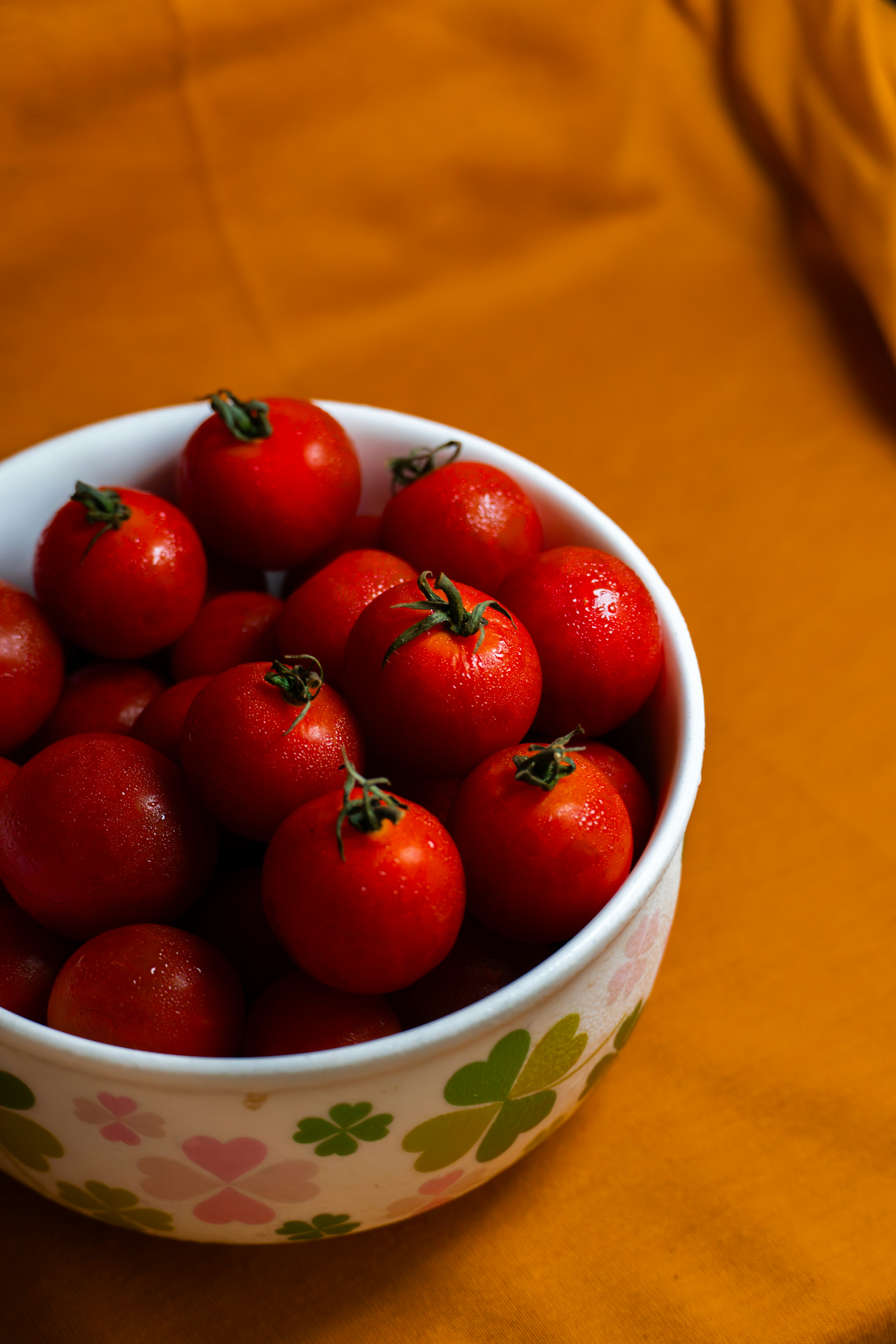 Crescent of Cherry Tomatoes in a Floral Bowl