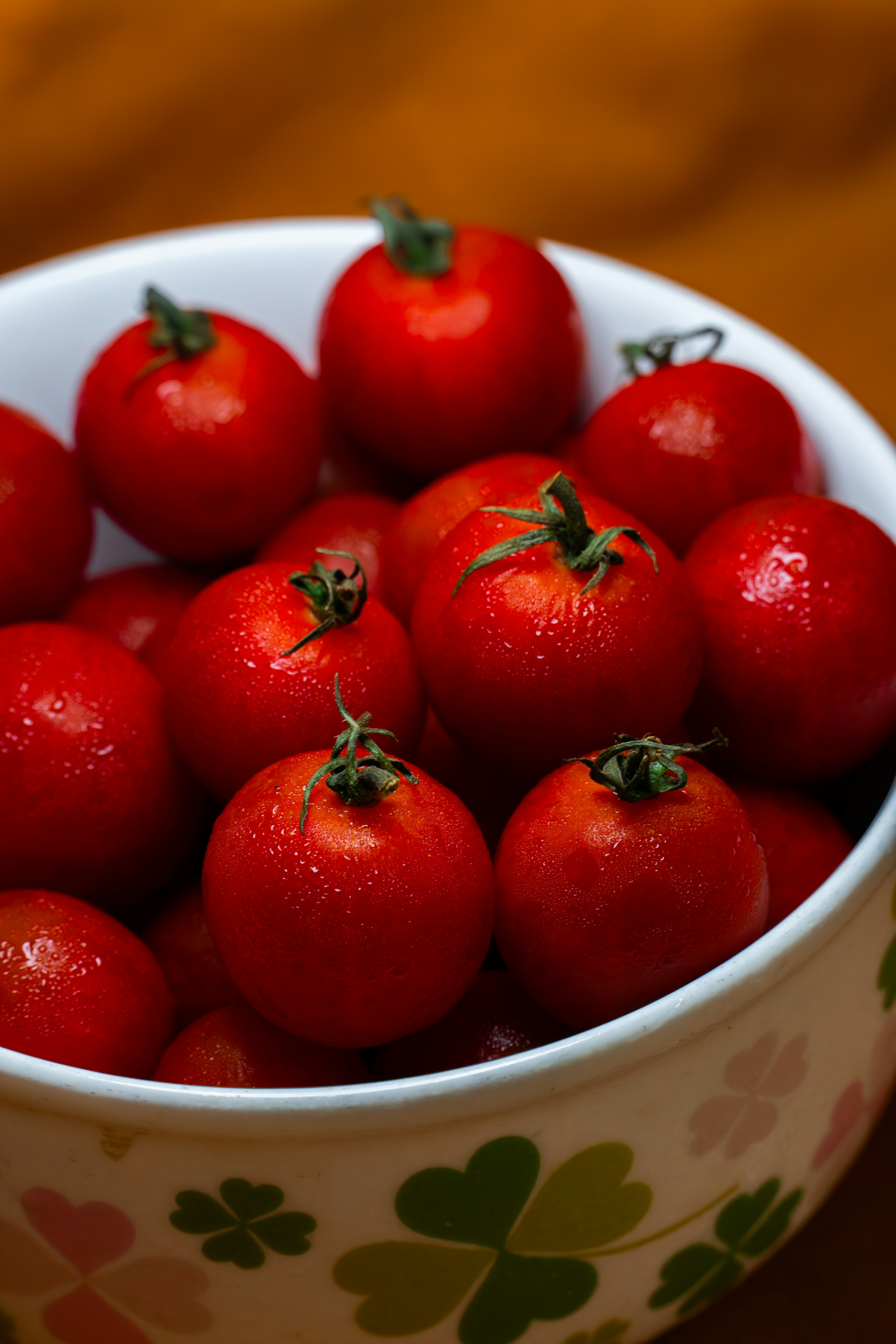 Red Pearls in a White Bowl: A Cluster of Tomatoes Close-Up