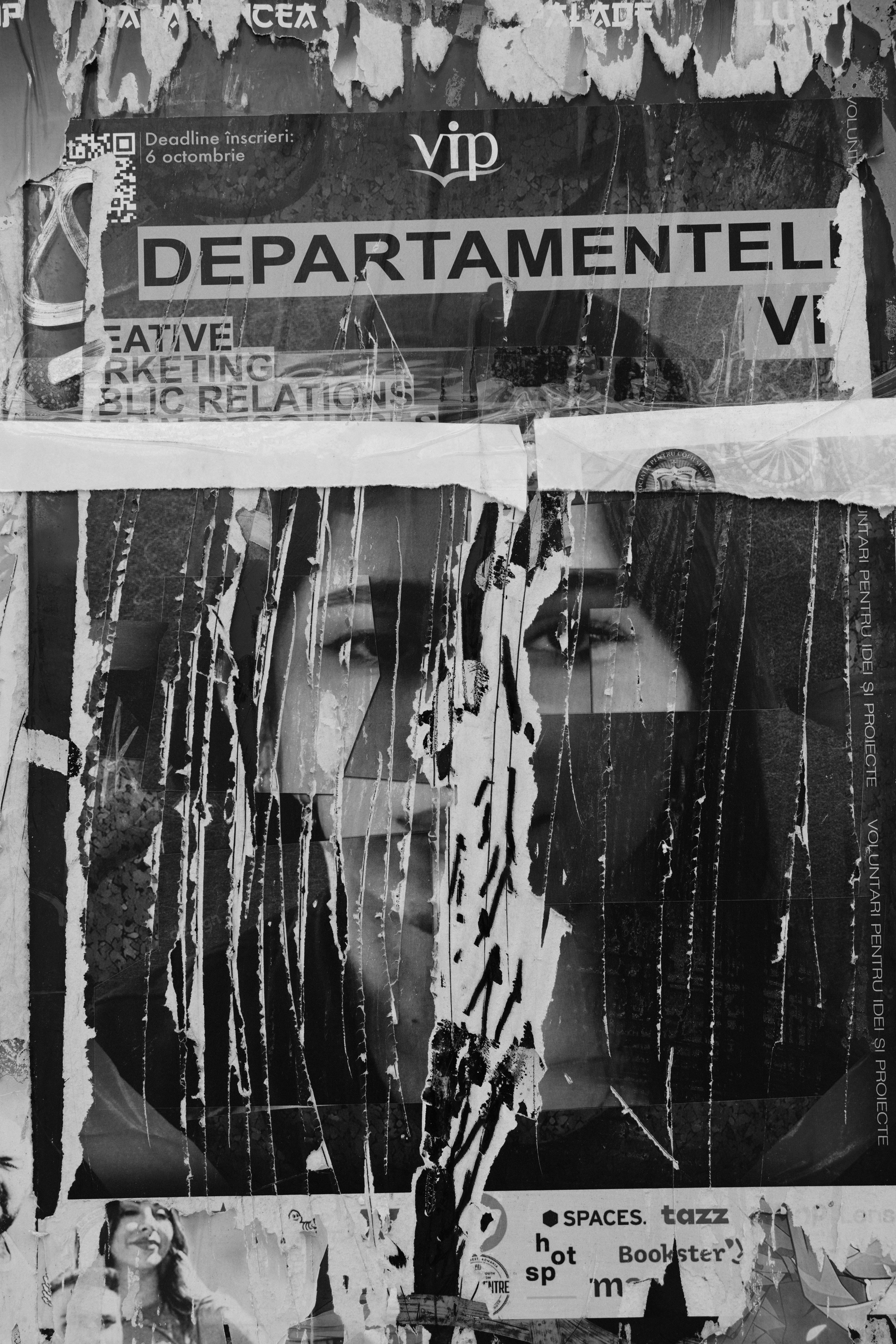 Fragmented Faces in a Tattered City Poster