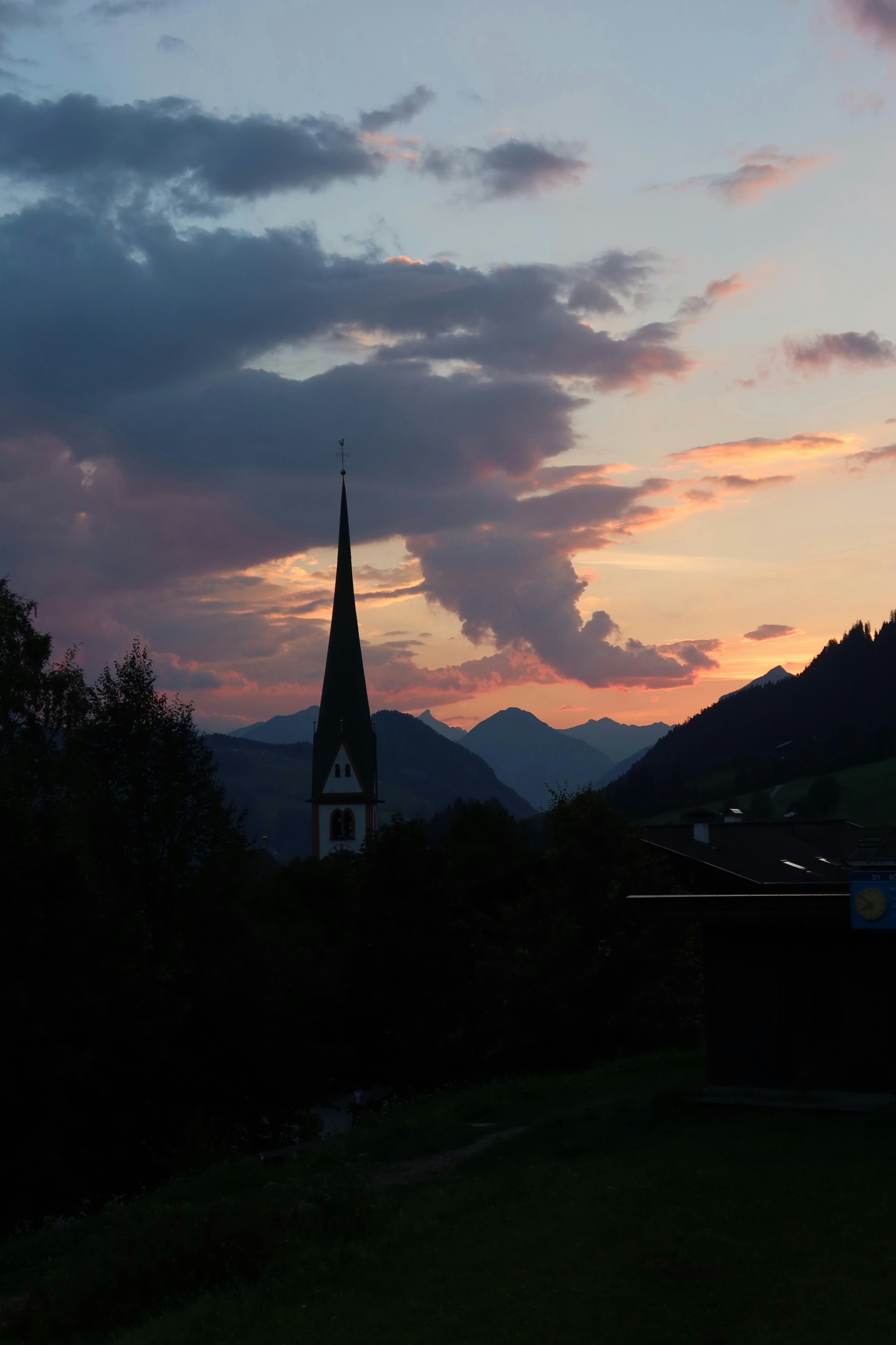 Sunset Bell Tower Over Rolling Valleys