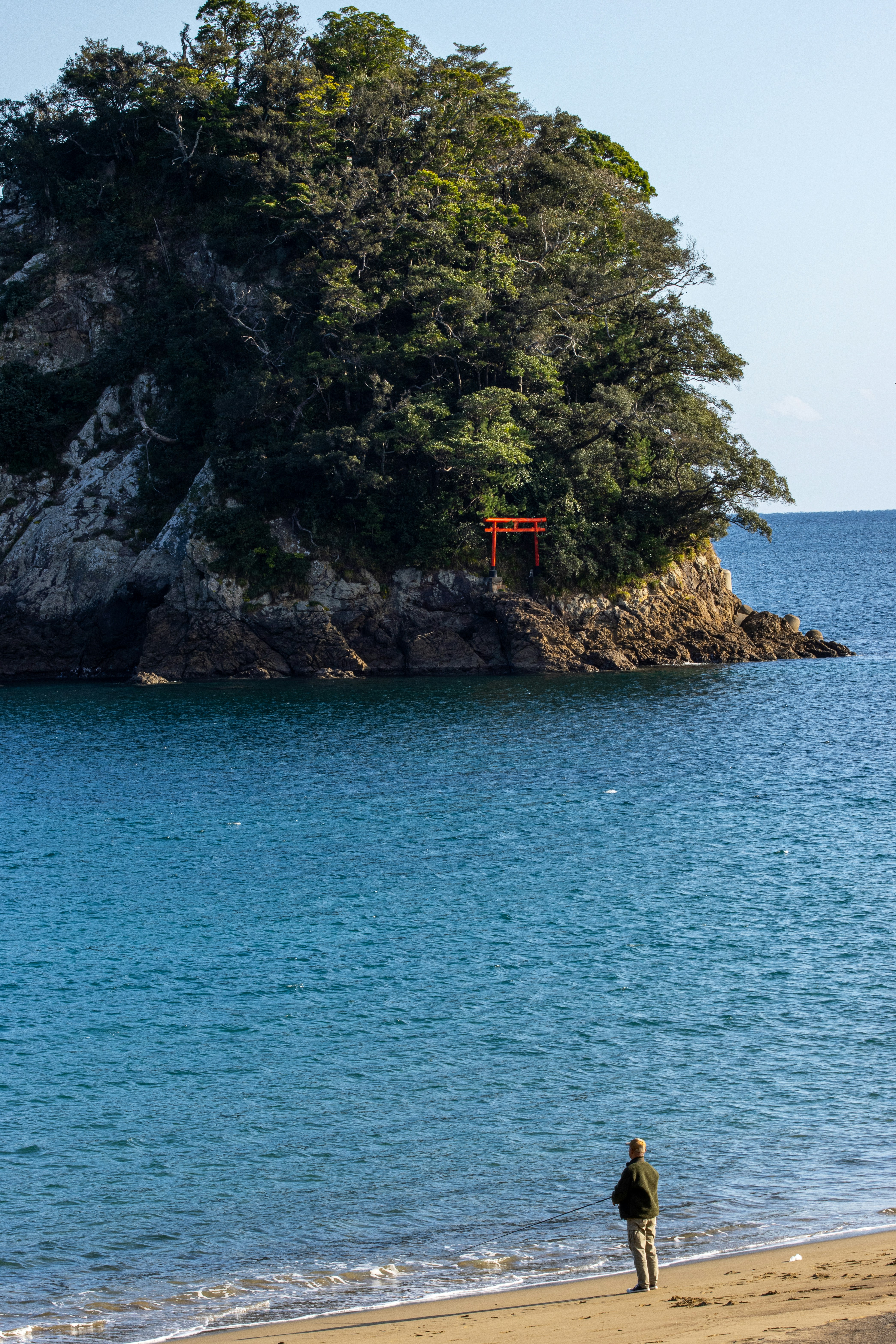 Solo Wanderer at the Edge of an Island Staircase of Blue