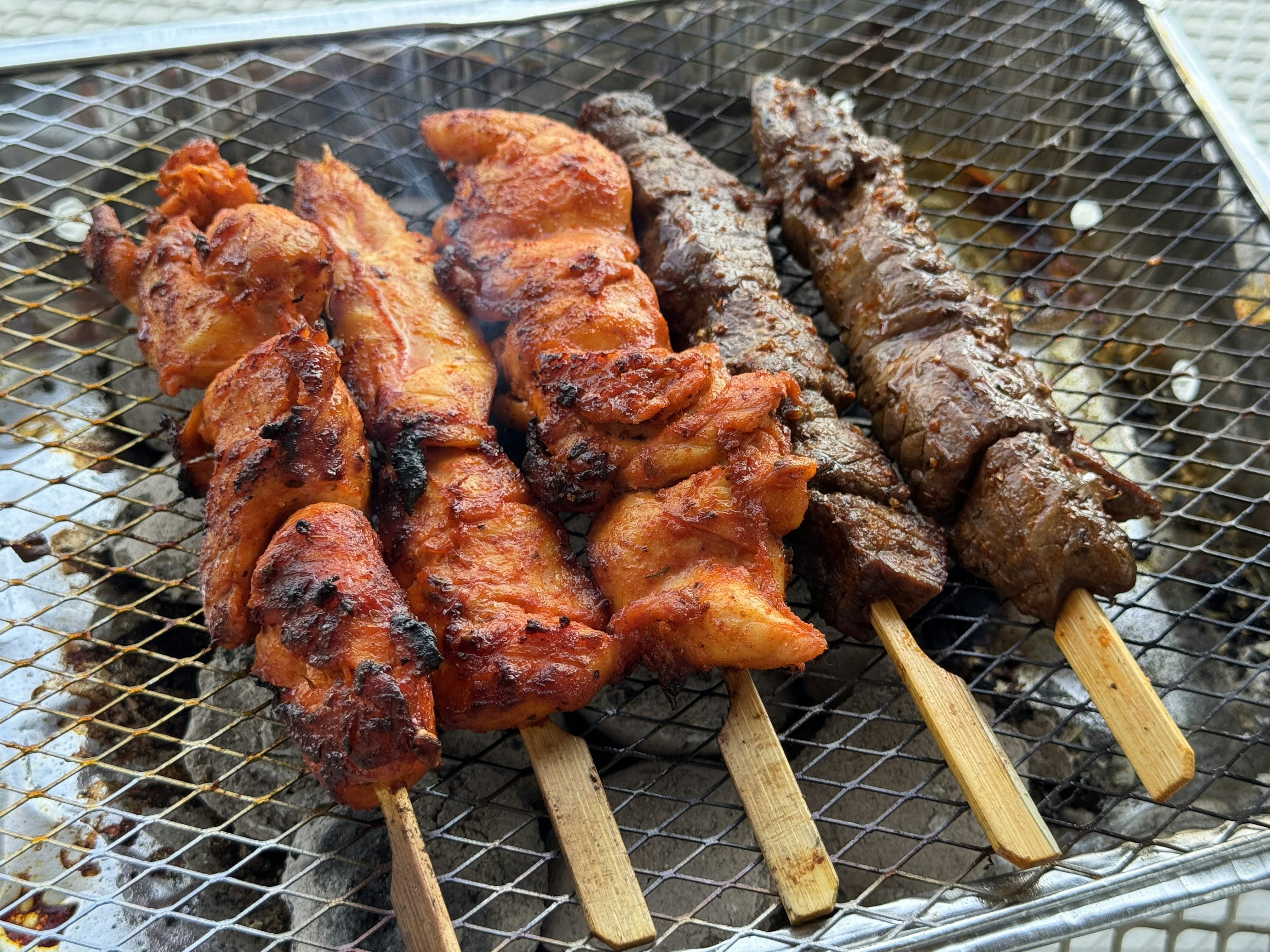 Charred Skewers on a Grill Mesh