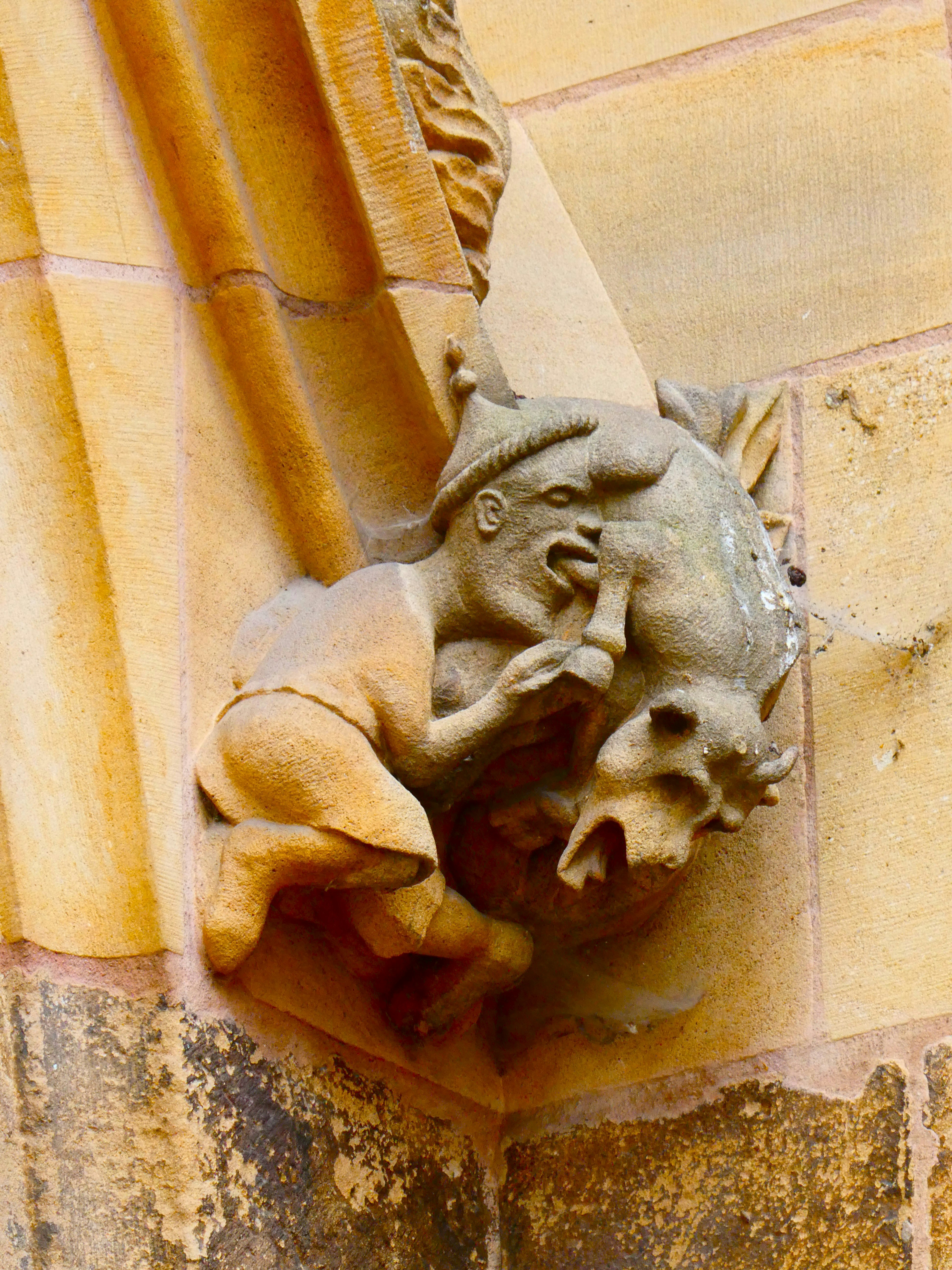 Gargoyle in Stone Wind: A Heroic Carving Guards the Corner