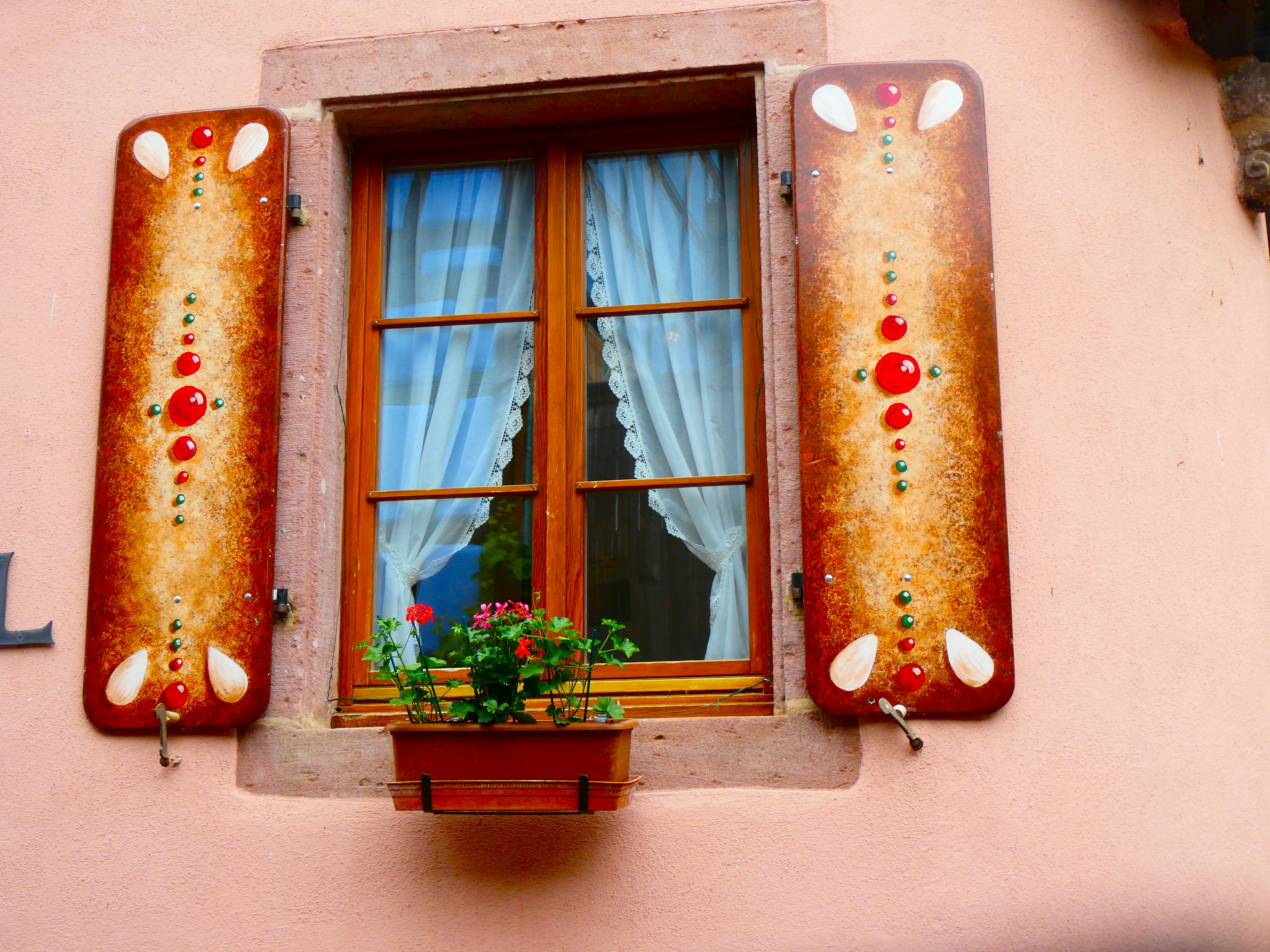 Pink Facade Window with Floral Window Box