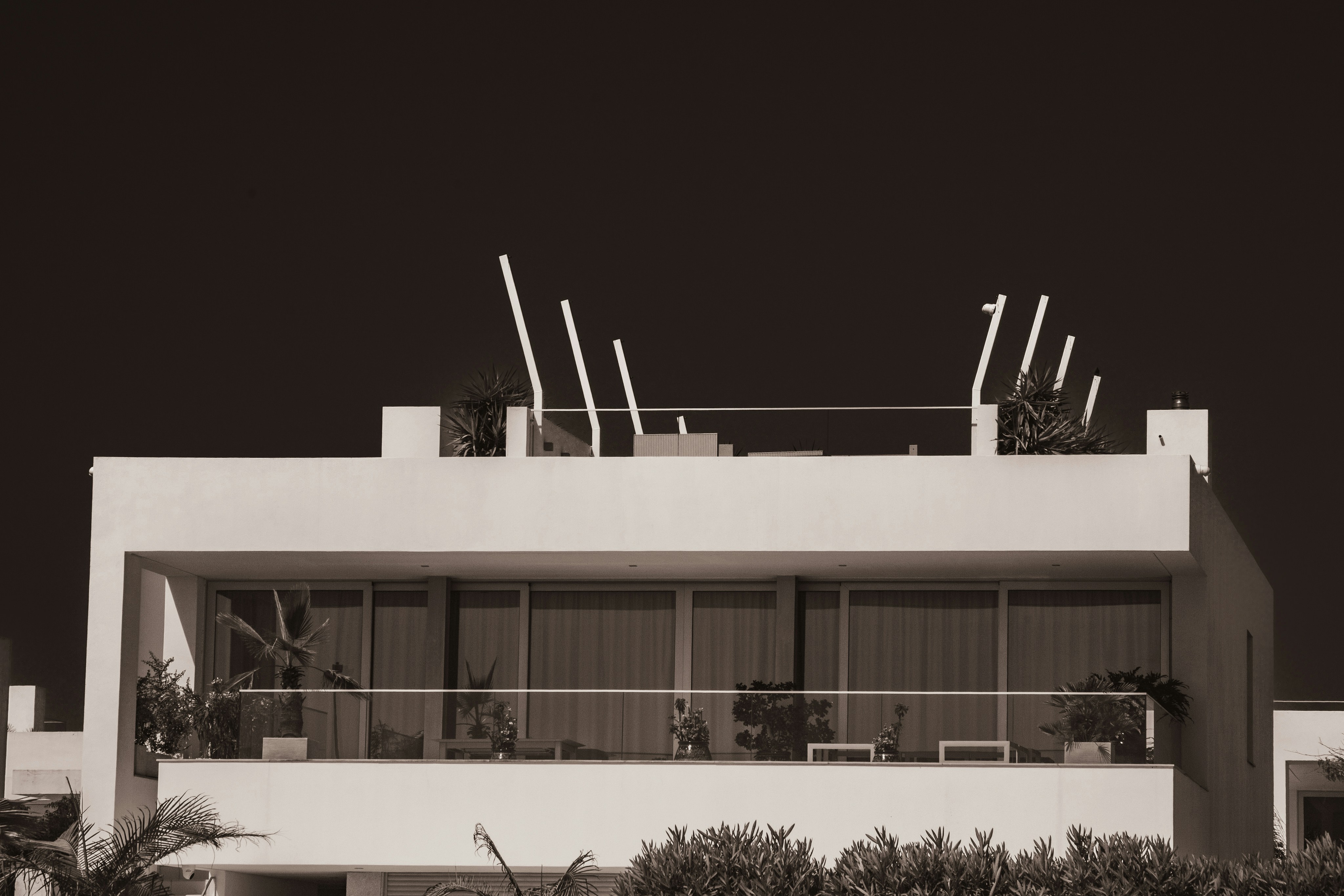 Modern terrace lines under a dusky sky