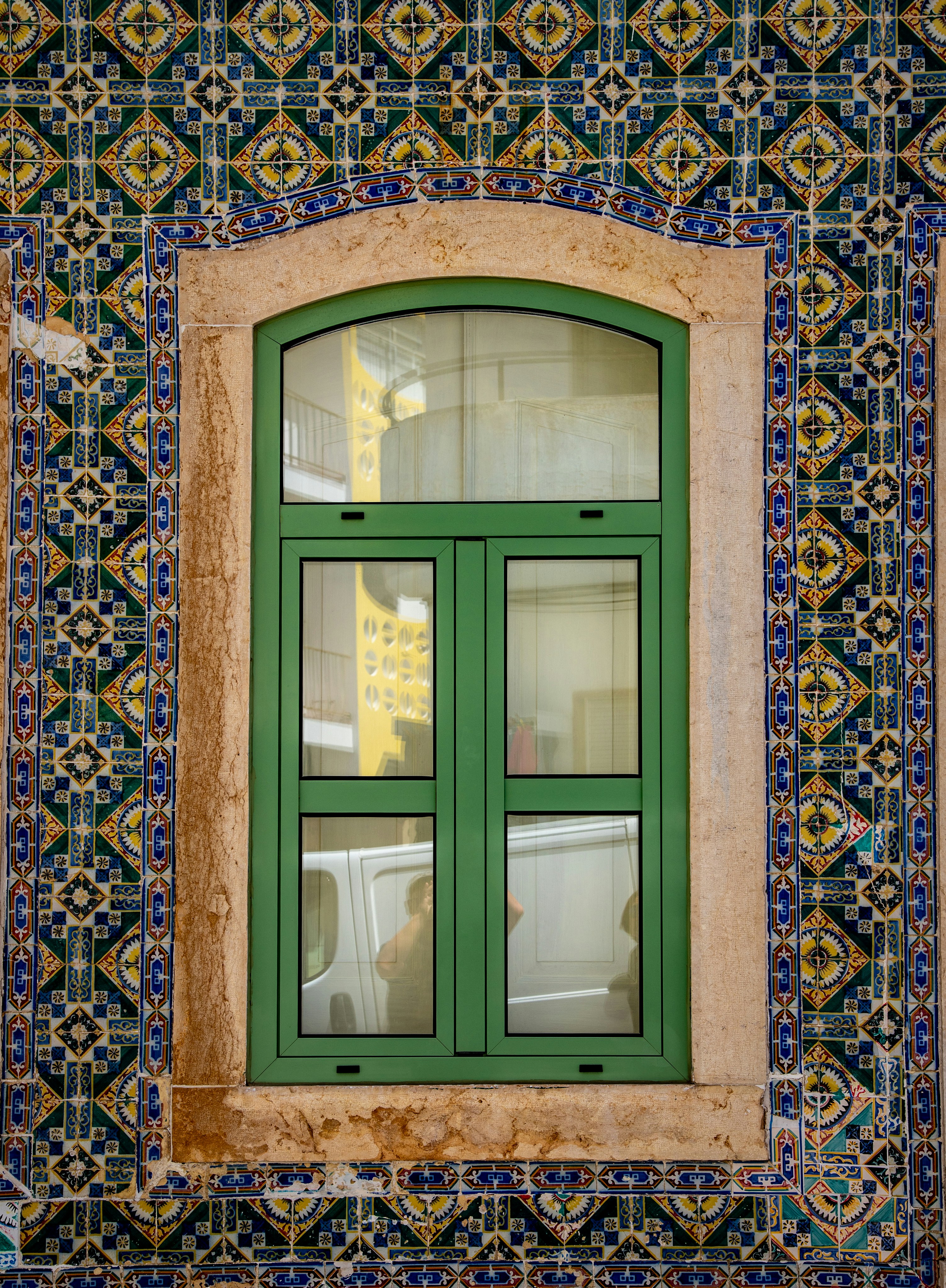 Emerald Window Veil: A Green Portal Set in Ornate Tilework