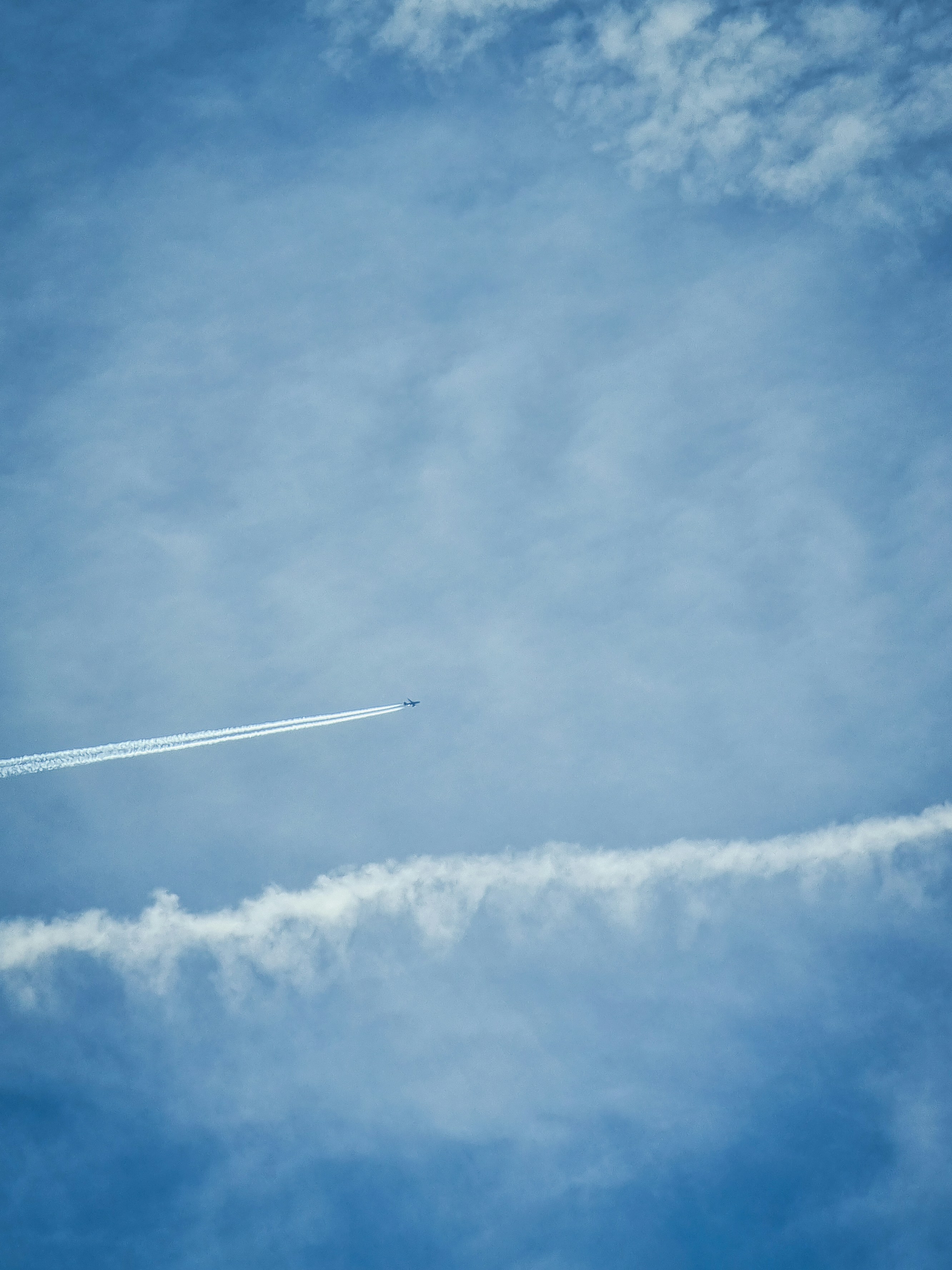 Jet Trail Across a Clear Sky