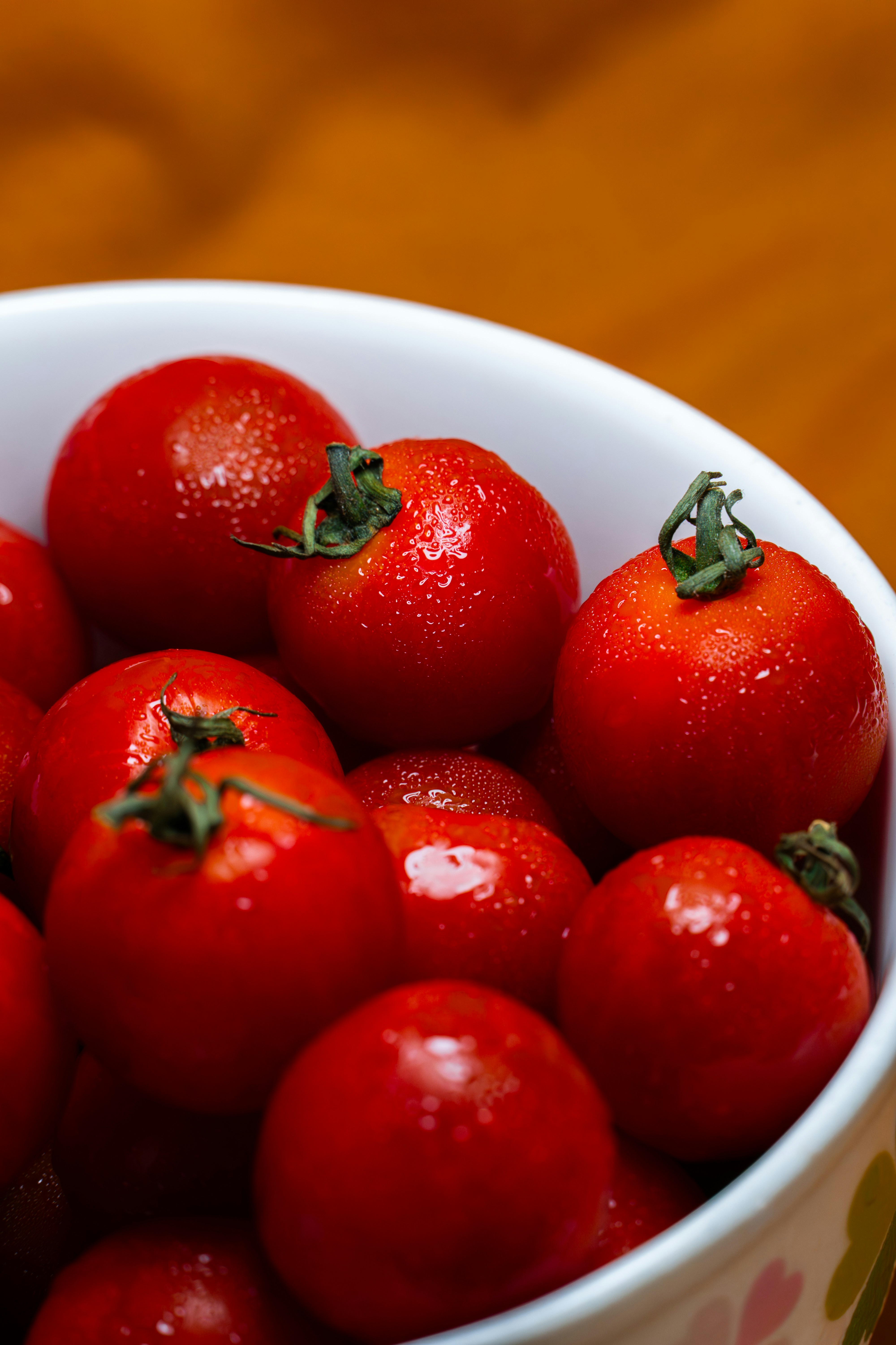 Crimson Harvest: A Bowl of Glossy Cherry Tomatoes