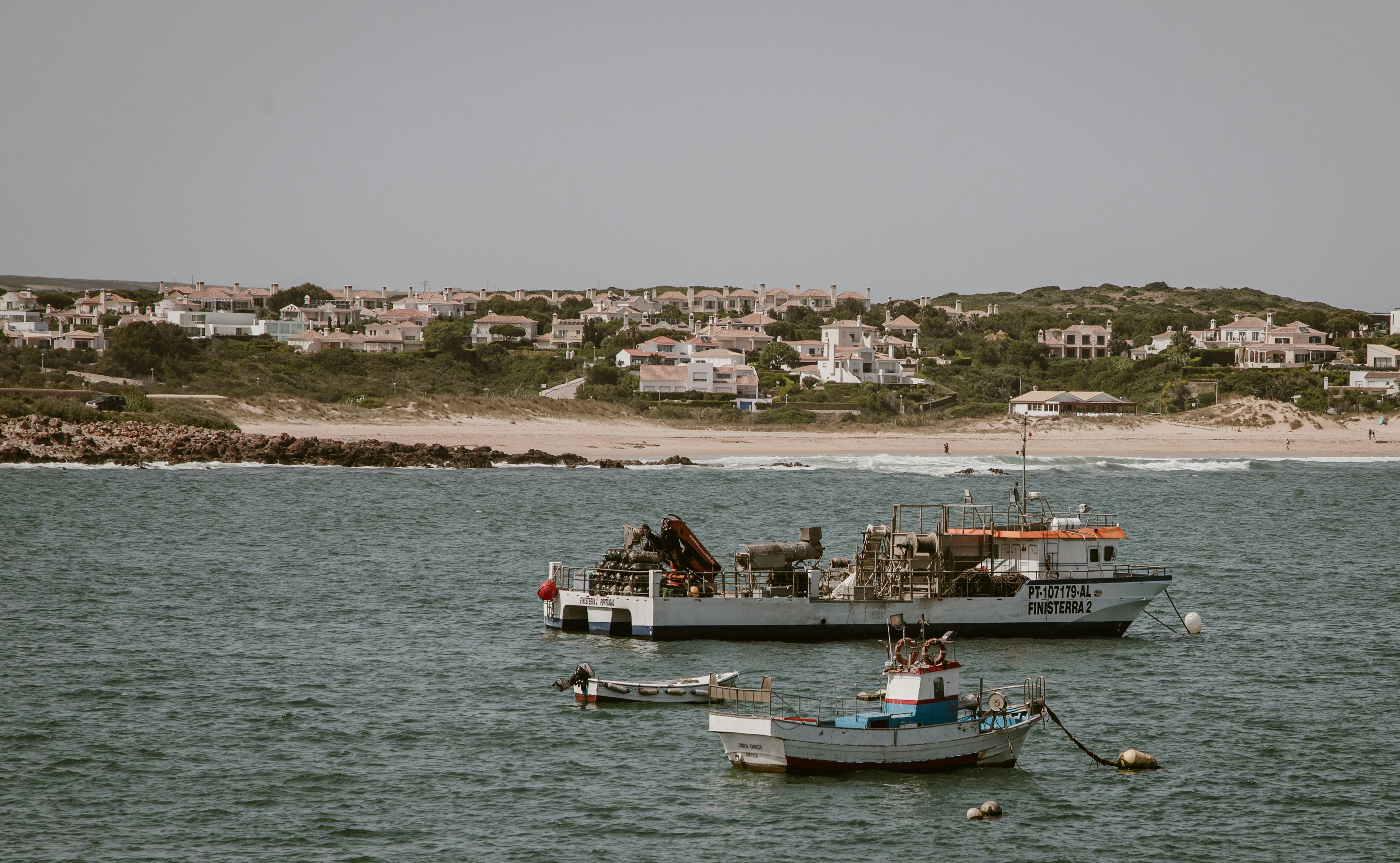 Fishing Boat Rendezvous off a Quiet Coastal Town