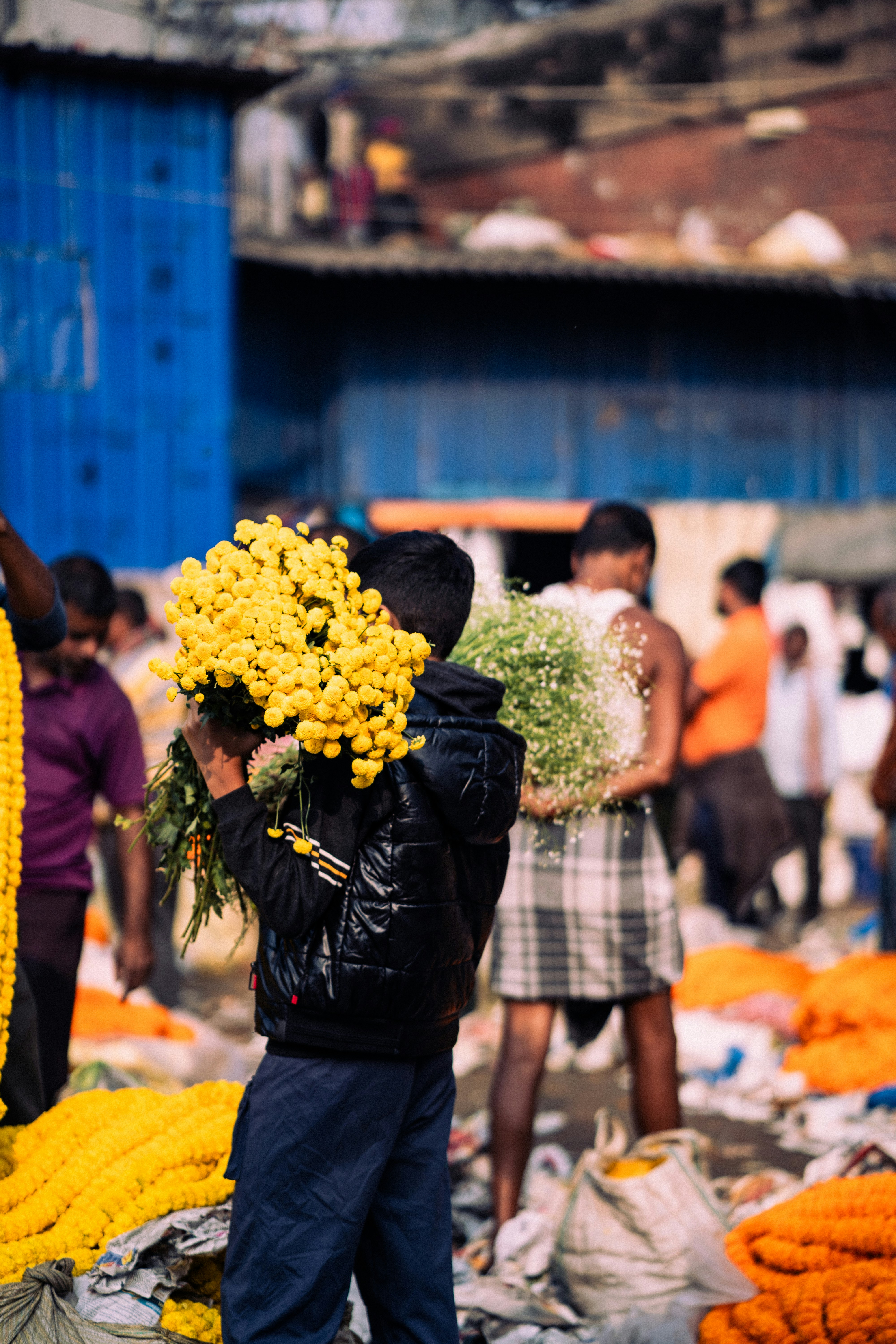 Colonel of Yellow Blossoms in a Bustling Market