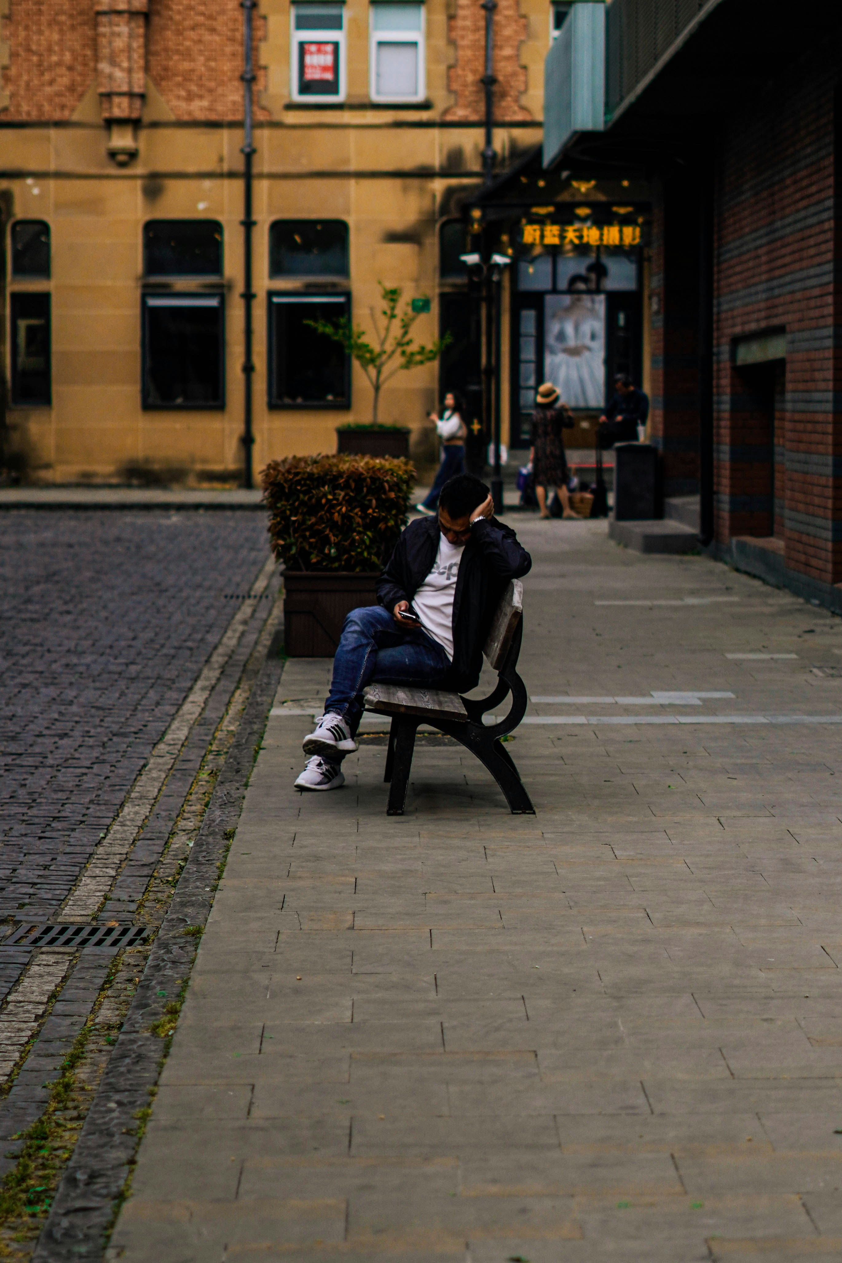 City Bench Break: A Quiet Moment Amid Urban Rhythm