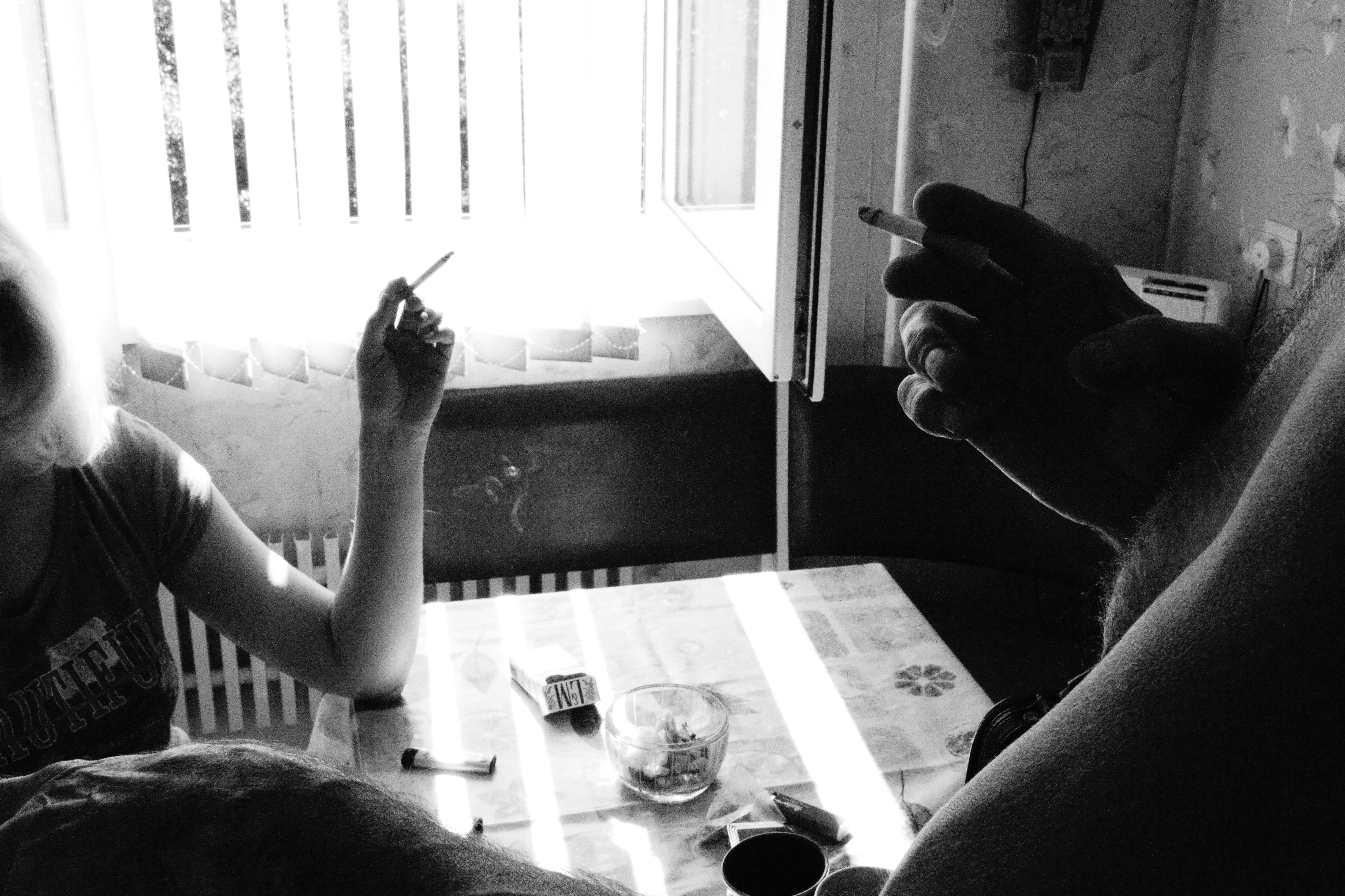 Cigarettes and Shadows: A Candid Corner of a Quiet Night