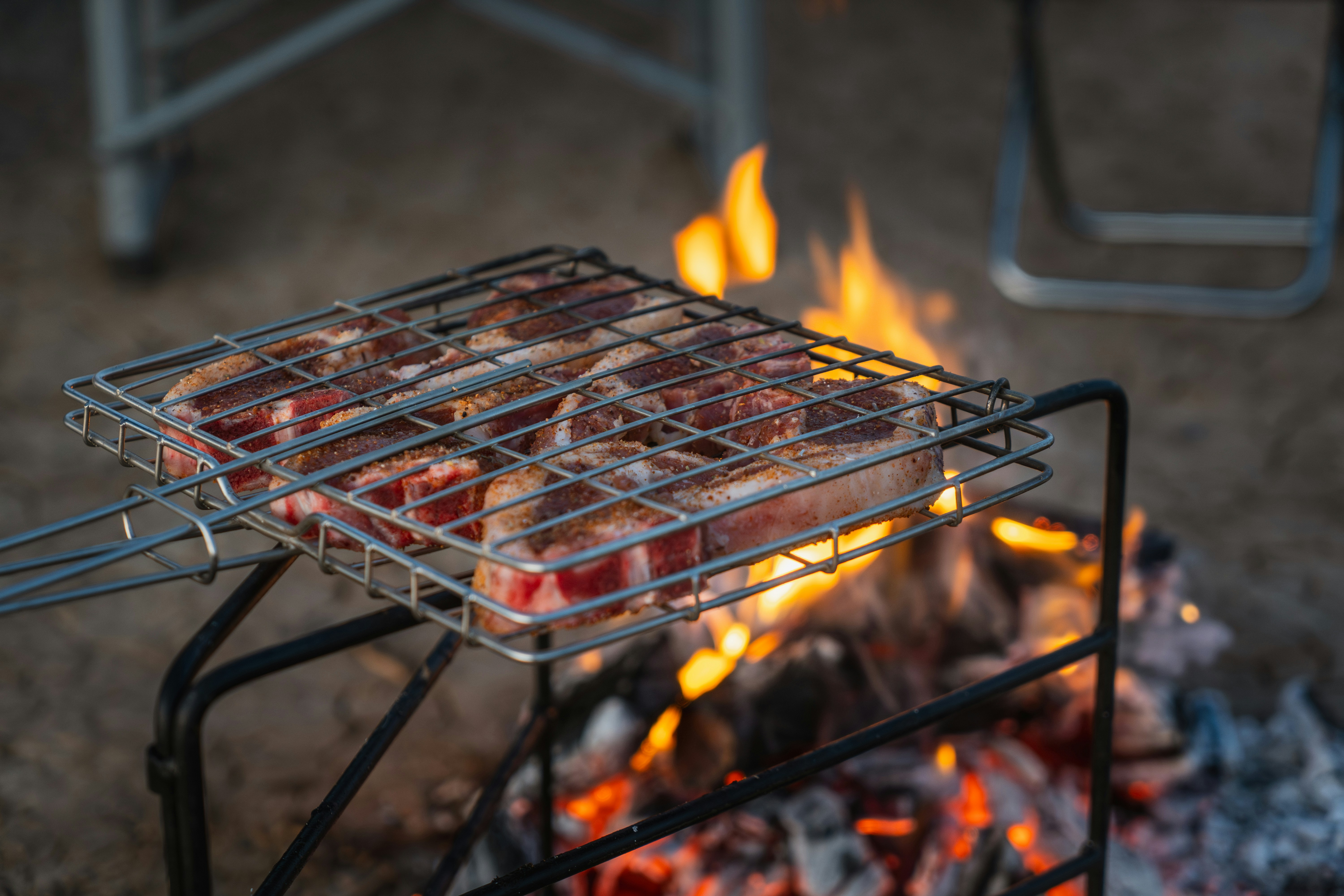 Coals, Grates, and Glowing Grills: A Campfire Cookout Moment