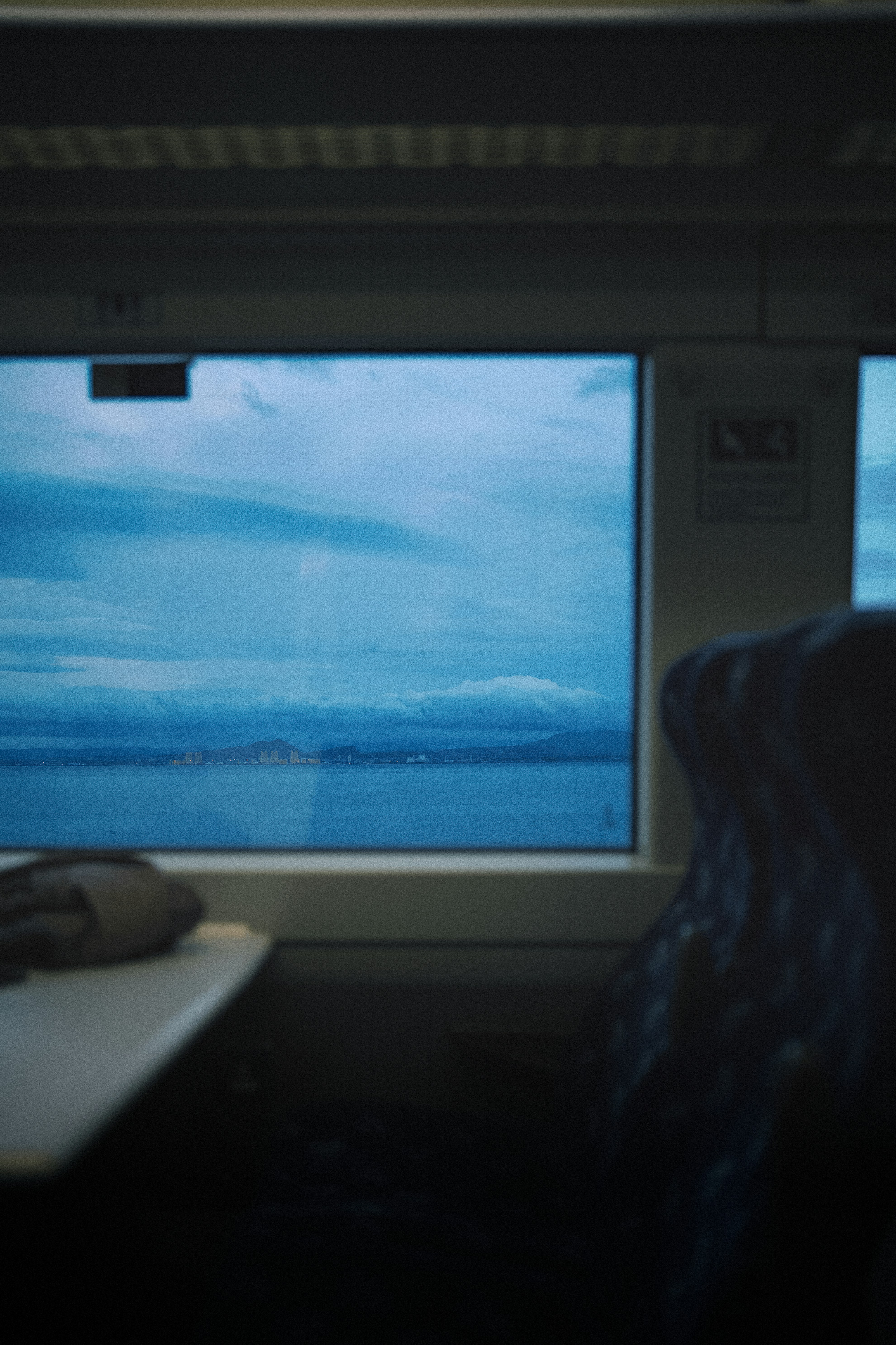 Blue Horizon Through a Quiet Train Window