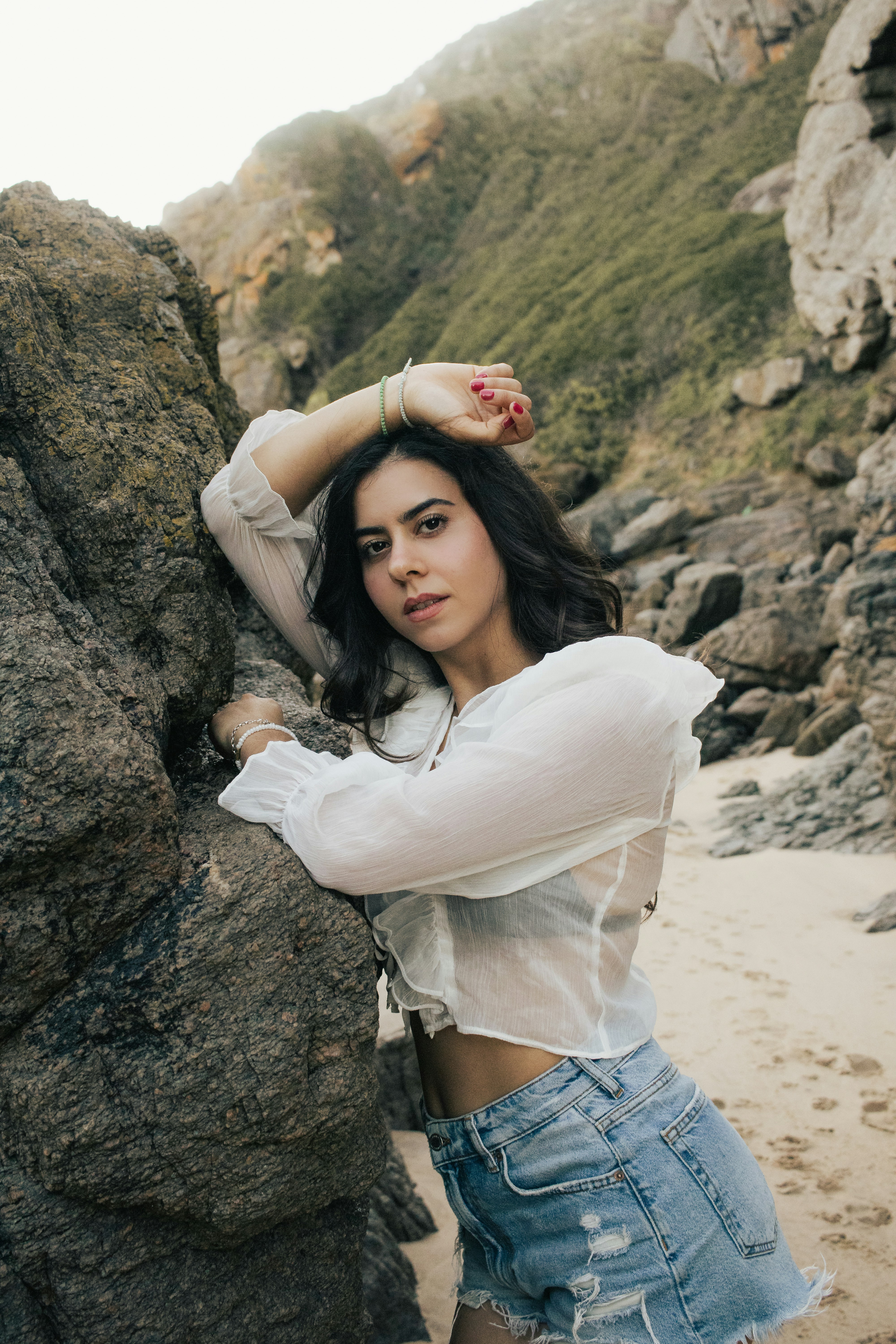 Portrait by the Sea Cliff: Resolute Gaze in White Linen