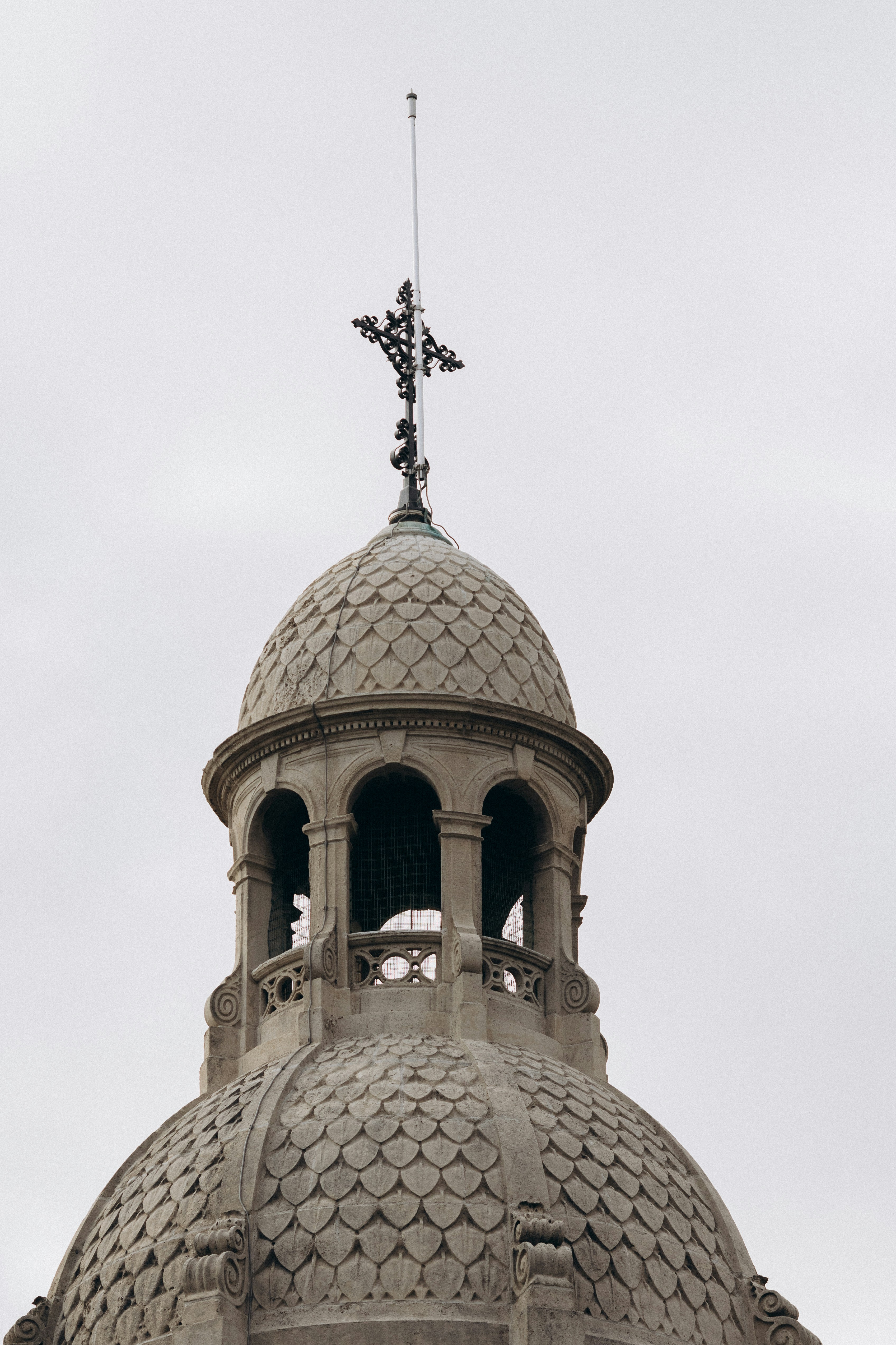Stone Dome with Lantern and Dragon Weathervane Surmounting a Historic Tower